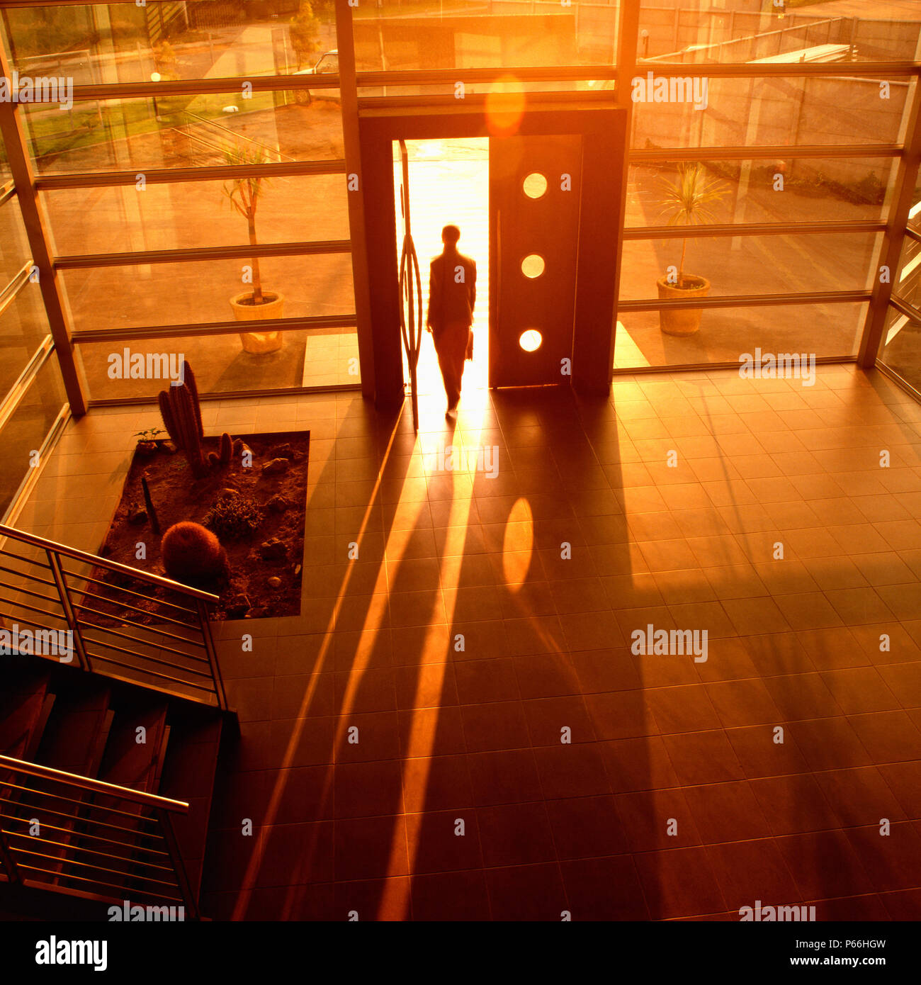 Man walking out exit door hi-res stock photography and images - Alamy