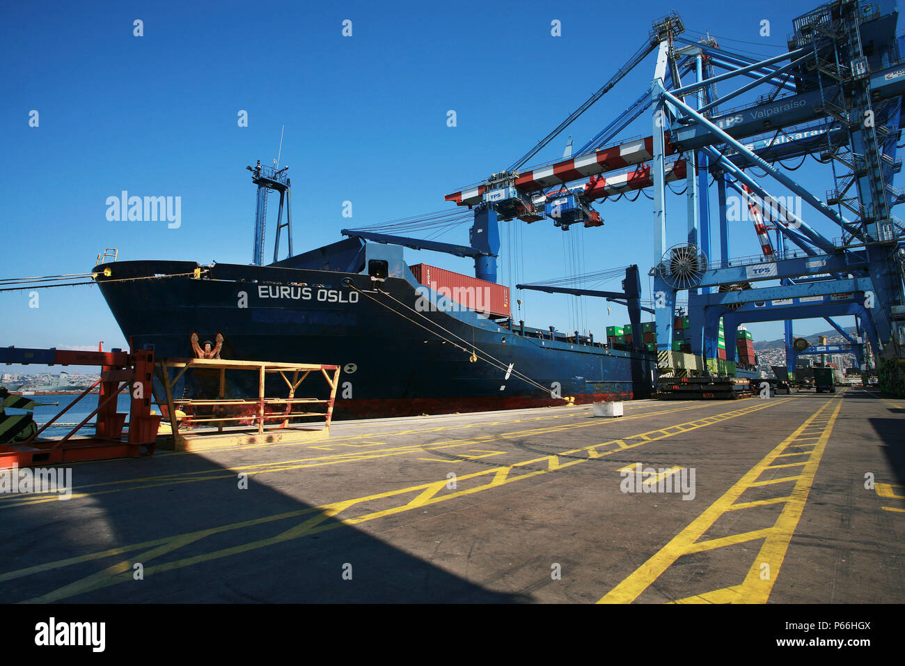 Cargo Ship And Cranes Of Valparaiso Stock Photo - Alamy