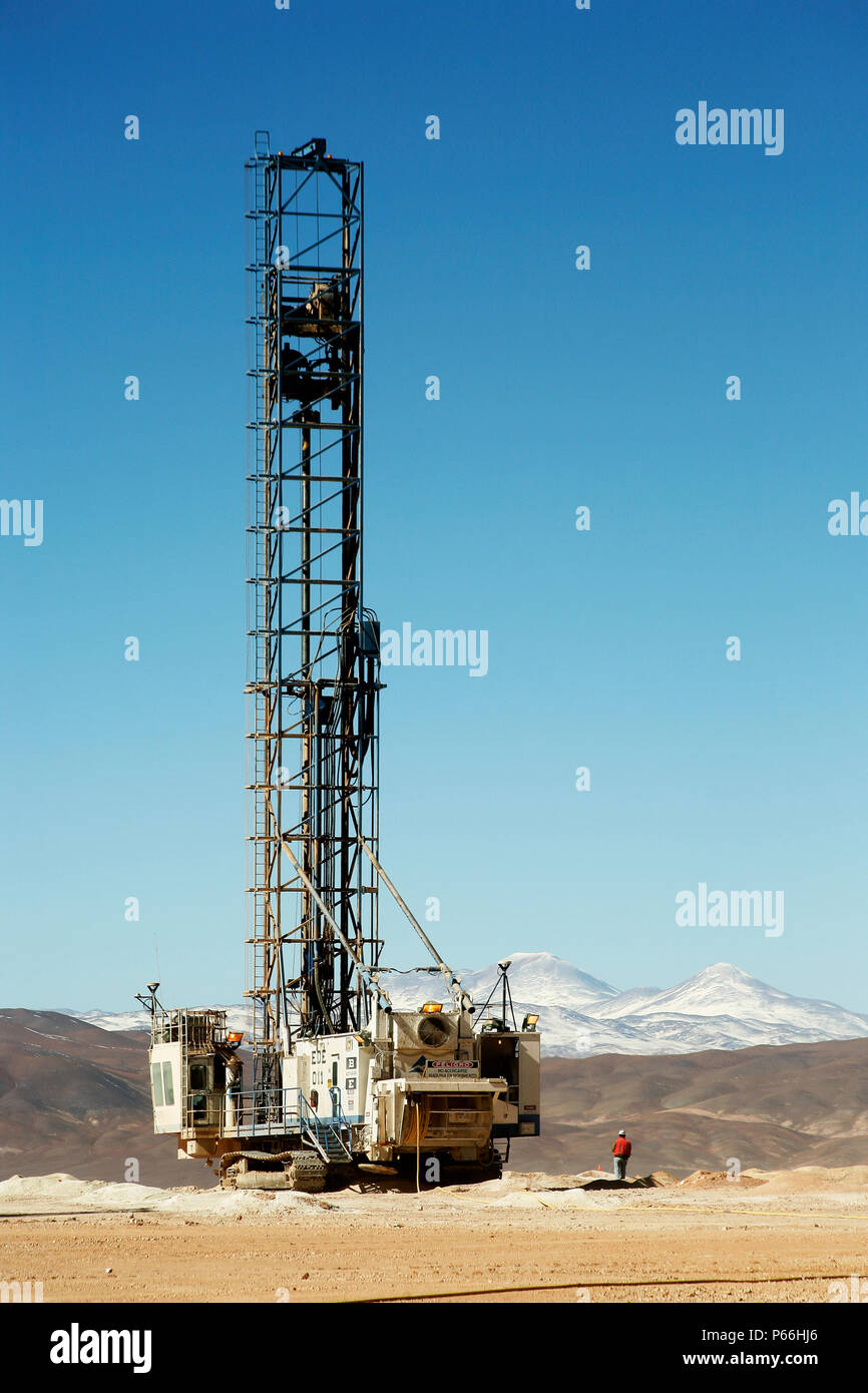 Drilling in Escondida with the Llullaillaco Volcano behind Stock Photo ...