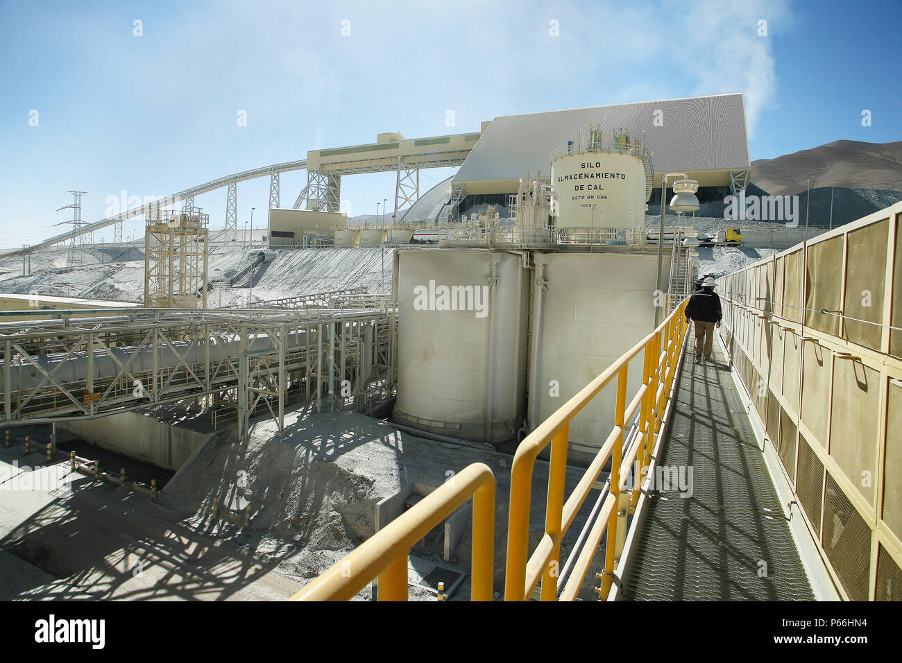 Inspector supervising copper concentrate plant, Escondida, Chile Stock ...
