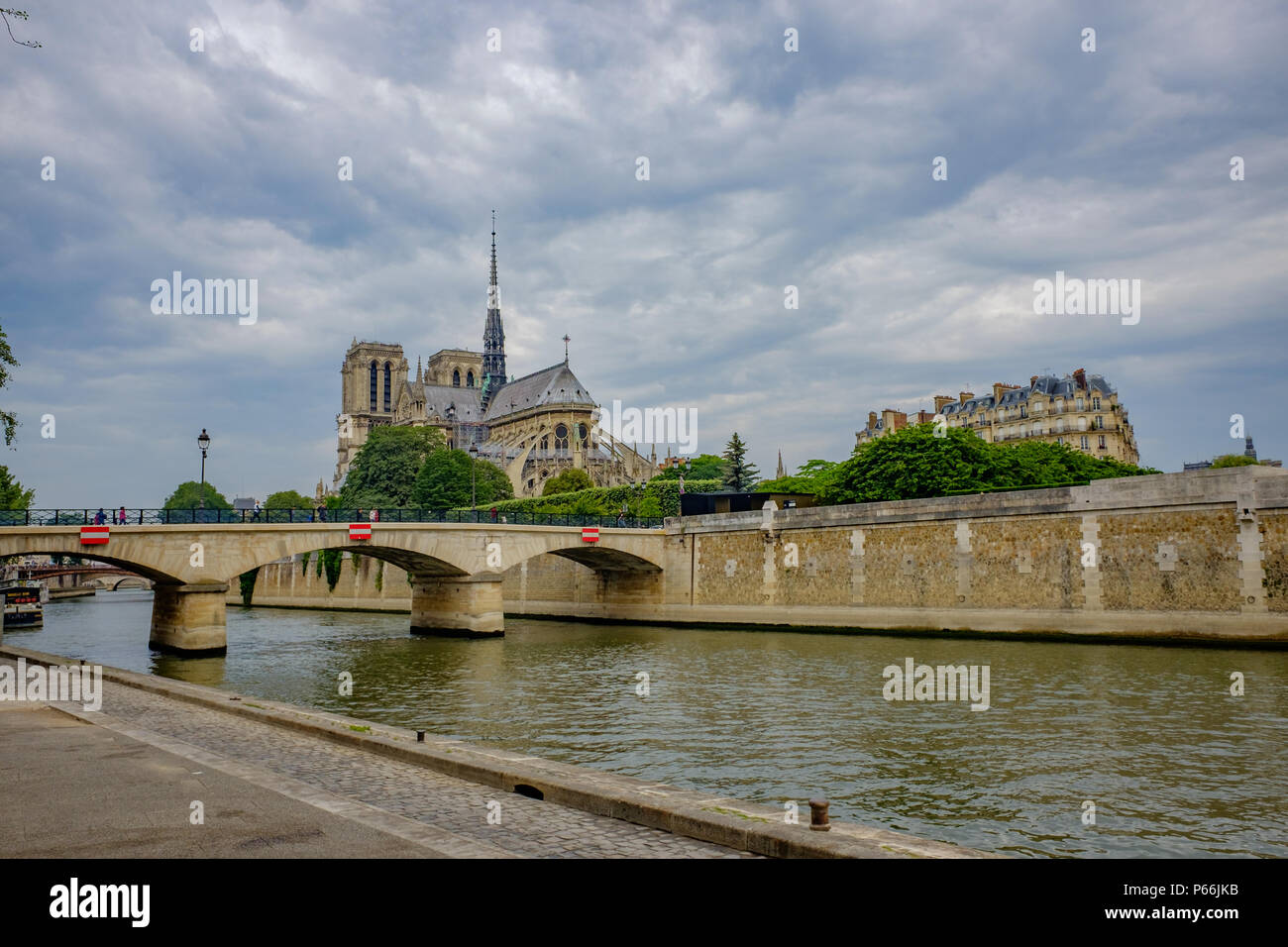 notre dame and the Bridge of the Archbishopric river seine paris Stock ...