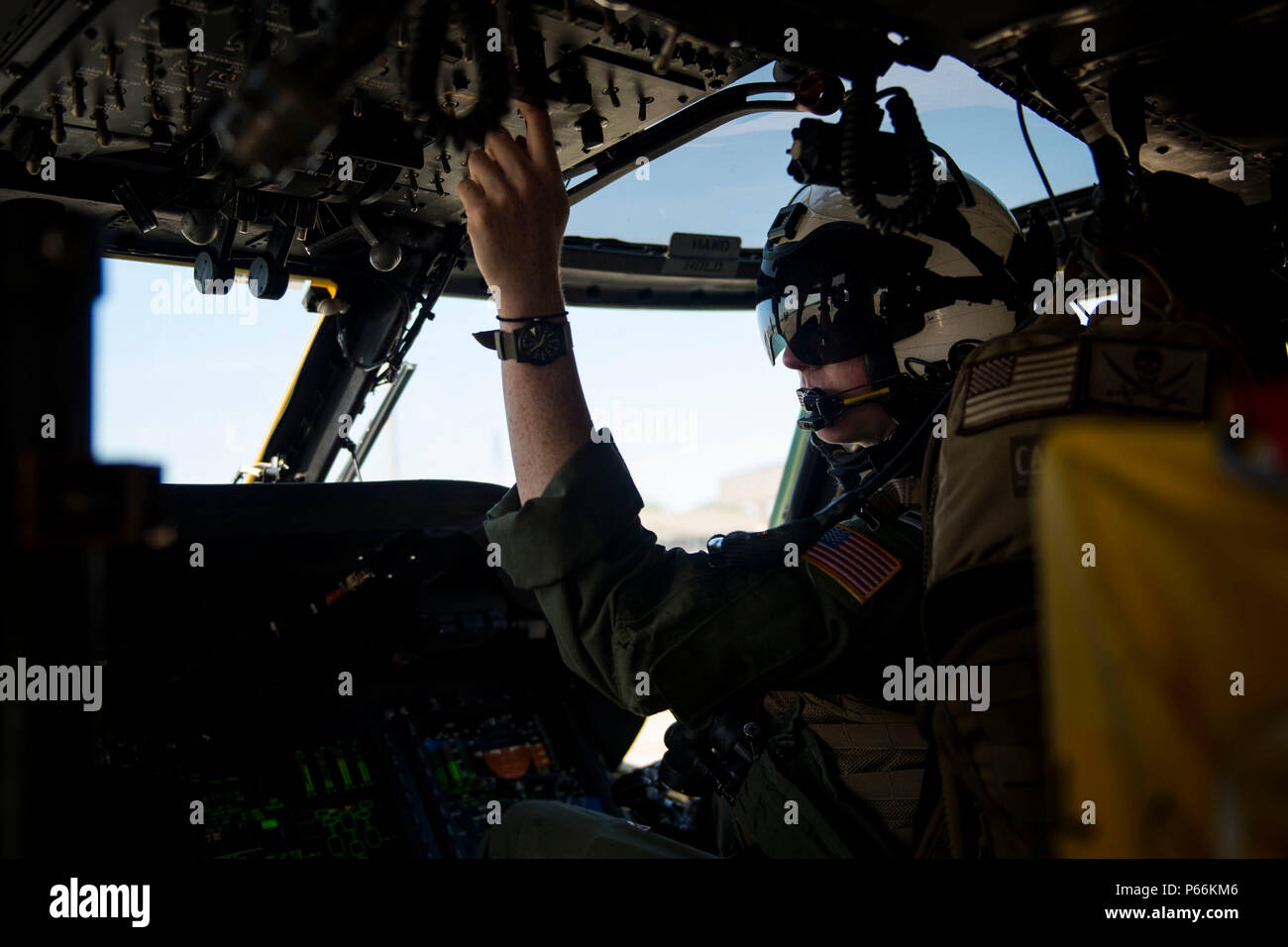 A U.S. Navy pilot with Helicopter Sea Combat Squadron 26 starts an MH ...