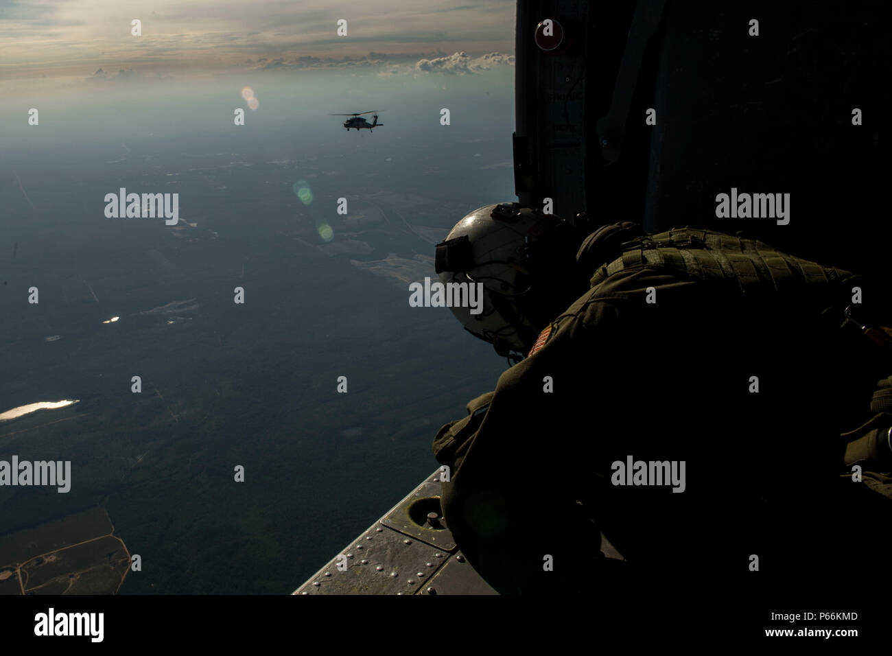 U.S. Air Force combat controllers conduct high-altitude low-opening ...