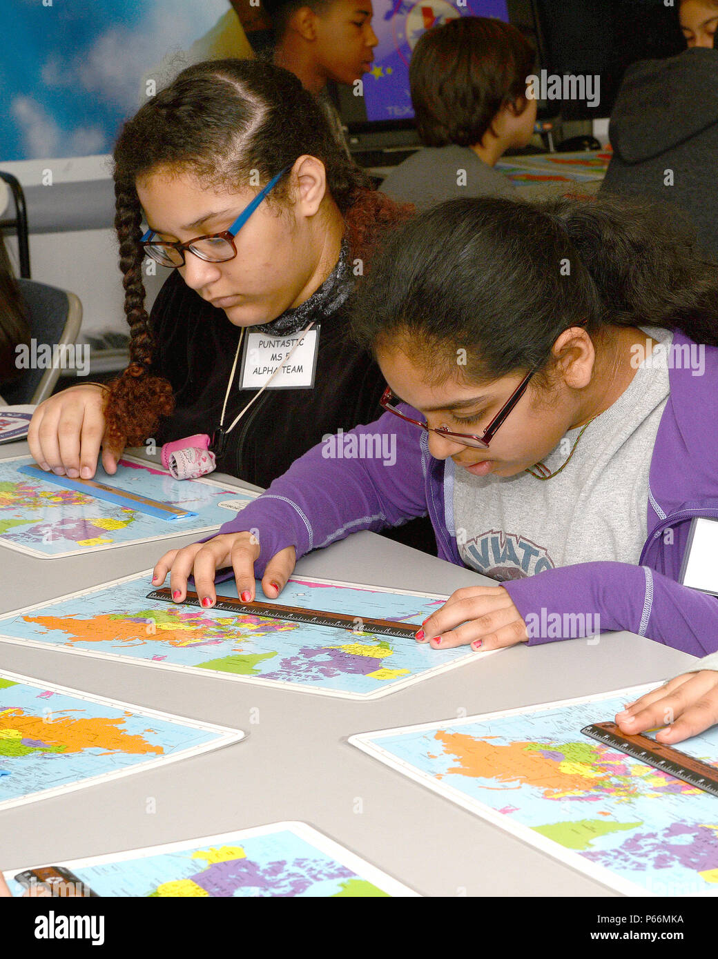 Fifth graders from Fred Roberts Middle School search for a point on a ...