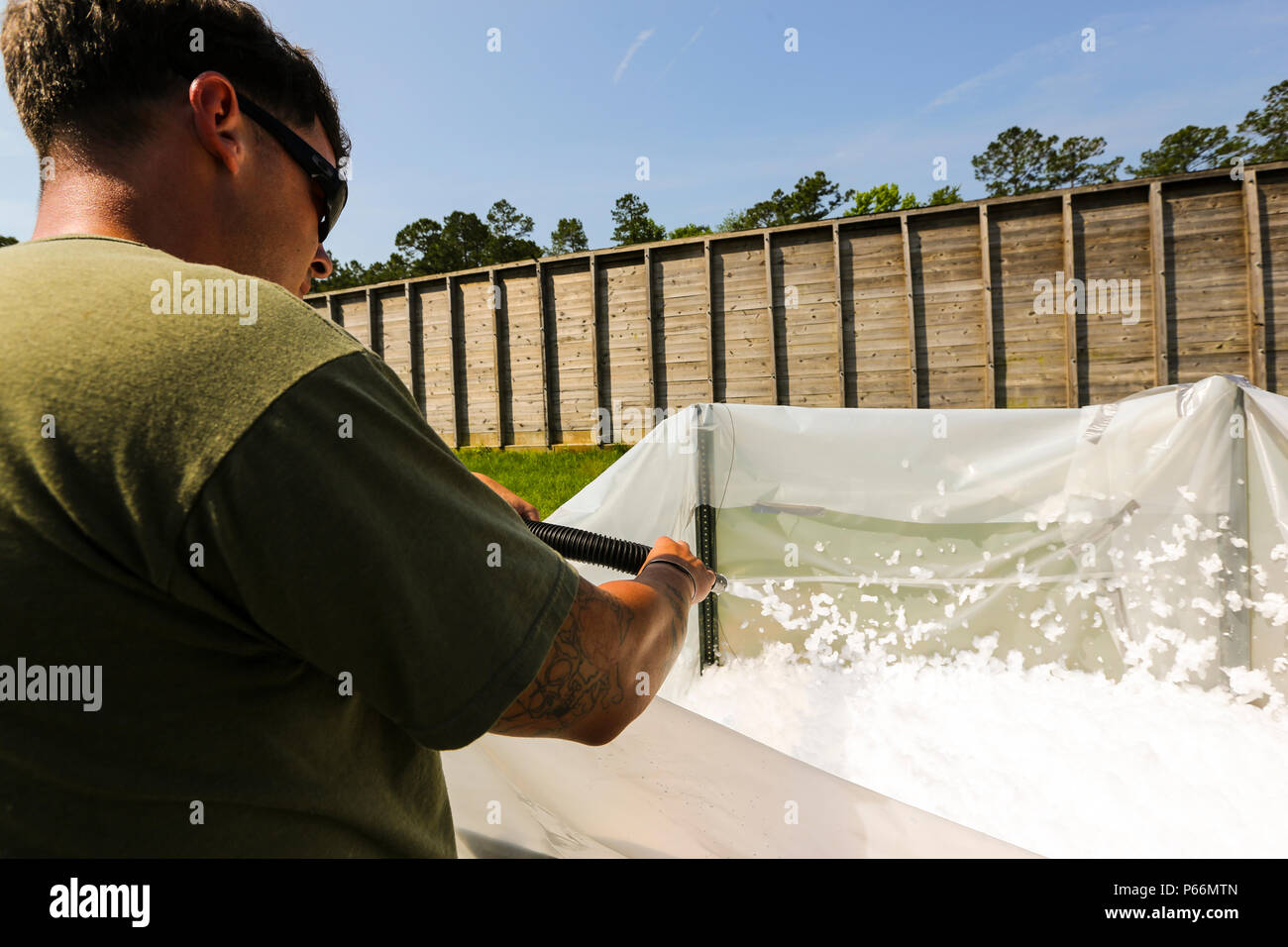 A Marine with 2nd Explosive Ordnance Disposal Company covers an ...