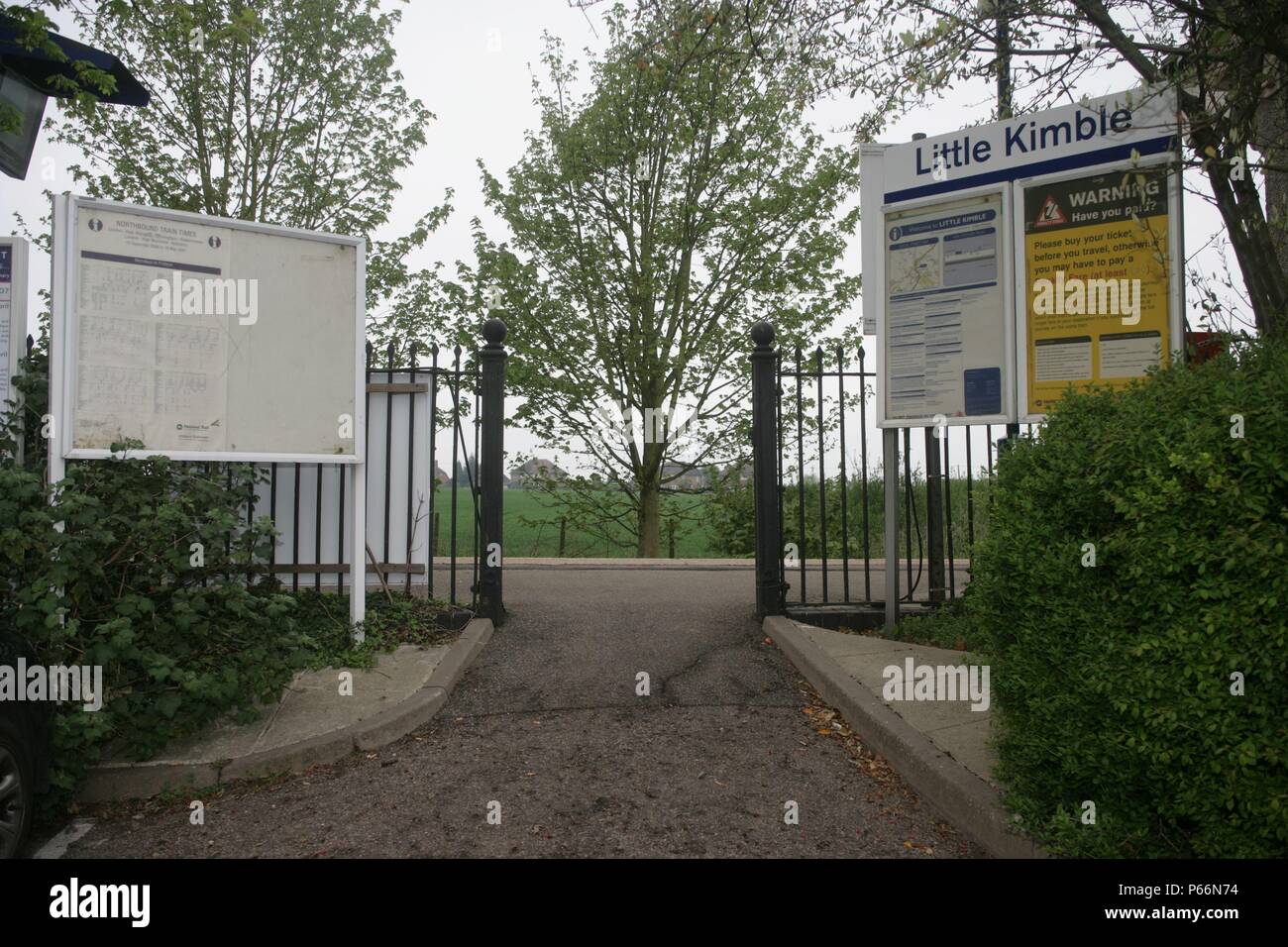 Entrance to the platform, timetable and information signs at Little ...
