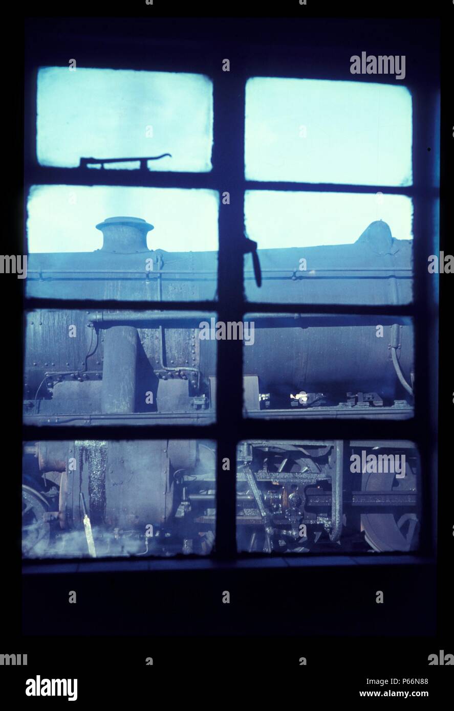 Ex LMS Stanier 8F, 2-8-0 seen through depot mess room window Stock ...