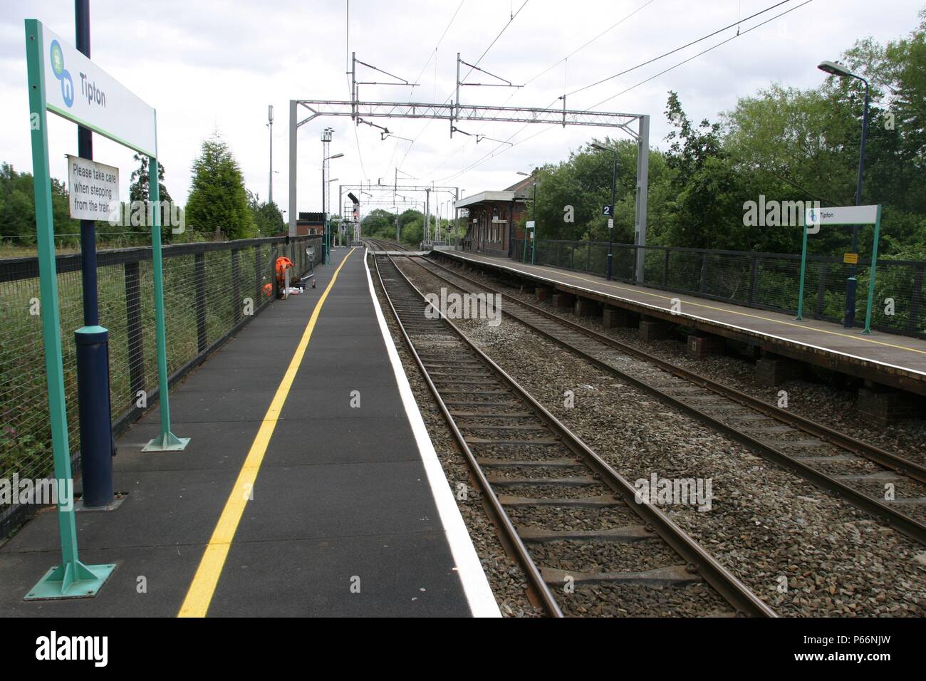 General platform view at Tipton station, West Midlands, showing signage ...