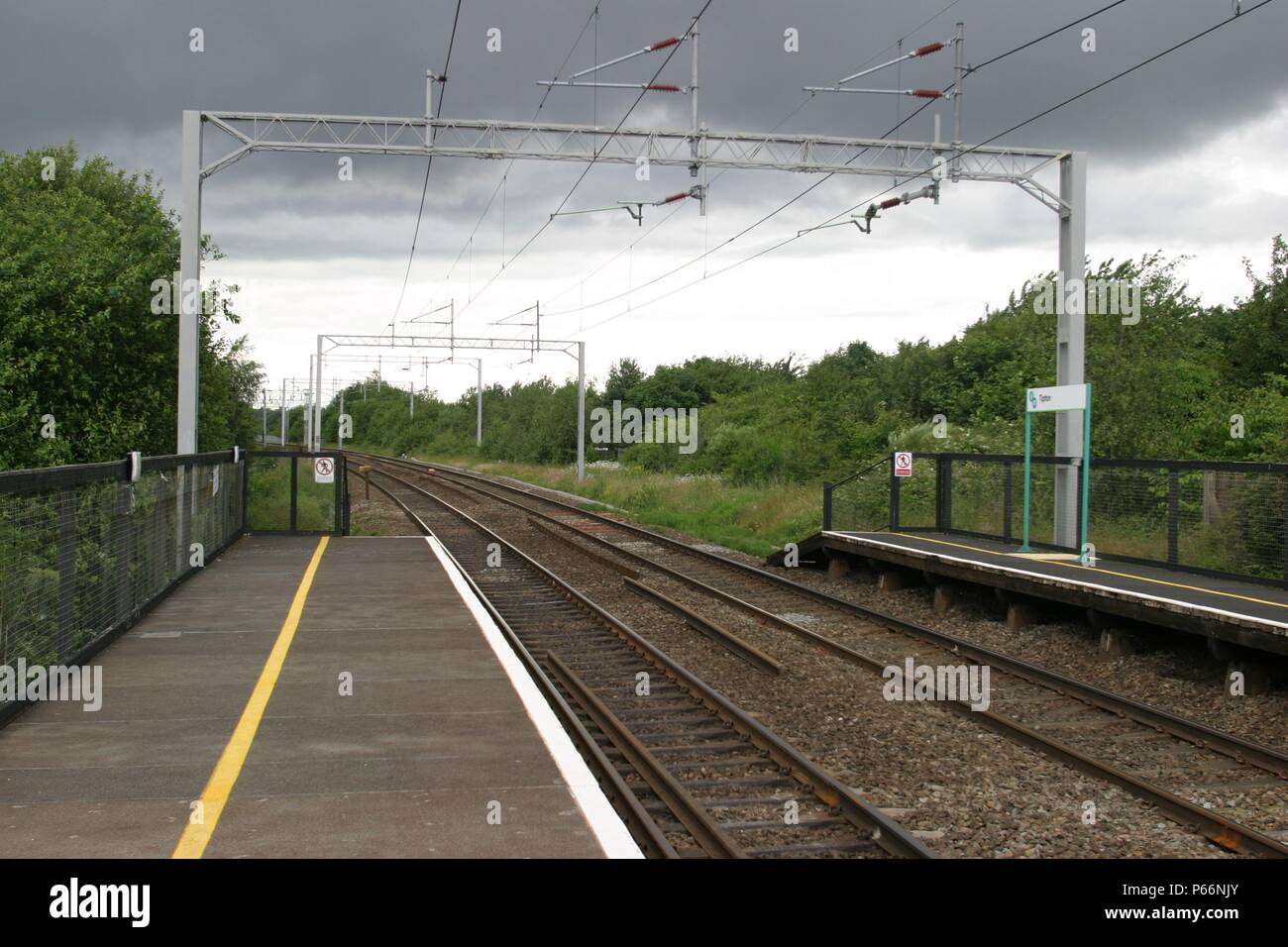 General platform view at Tipton station, West Midlands, showing signage ...
