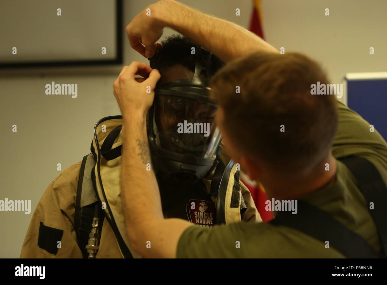 A Marine with the Chemical Biological Radiological and Nuclear (CBRN ...
