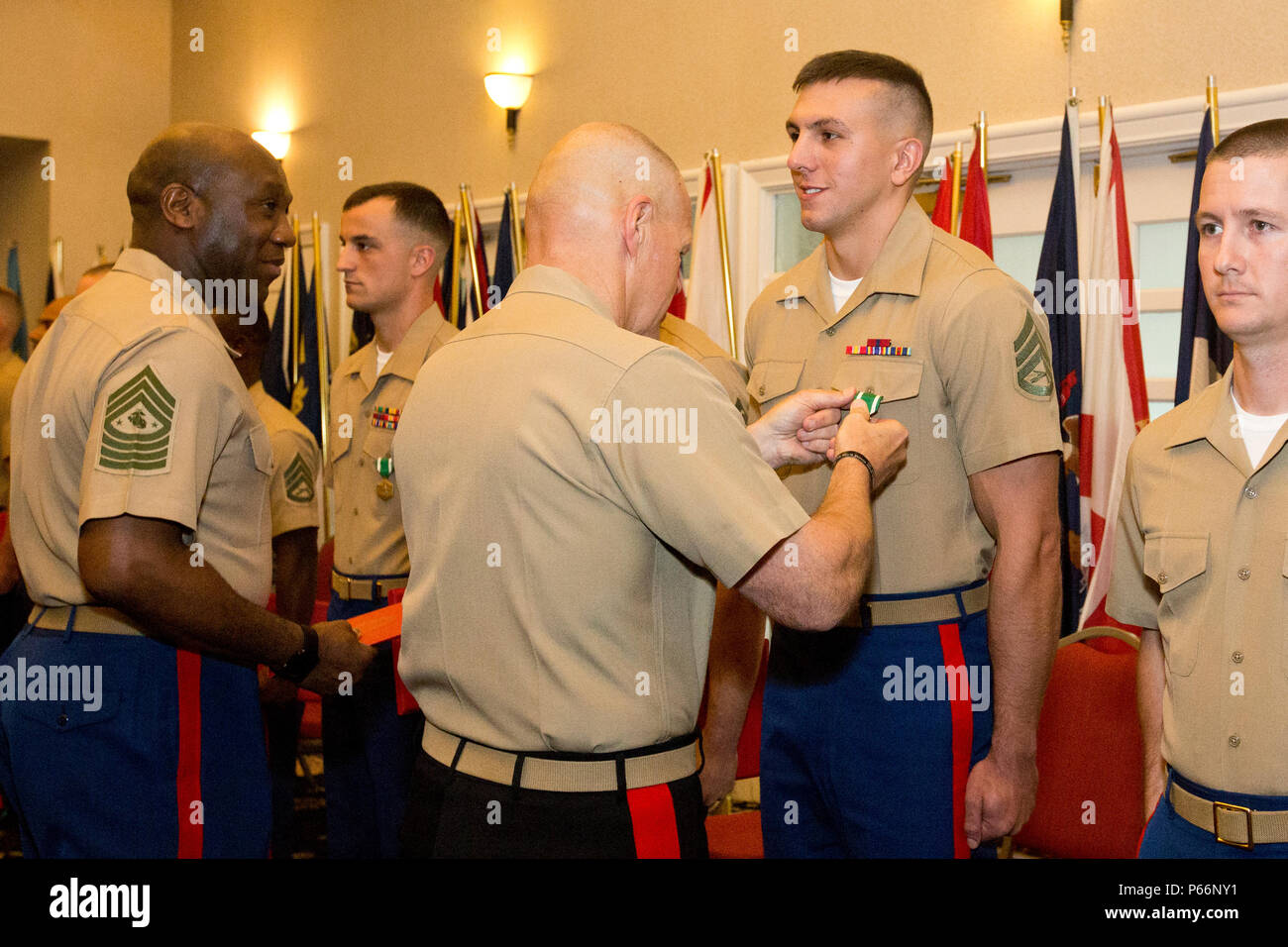 Commandant of the Marine Corps (CMC) Gen. Robert B. Neller presents ...
