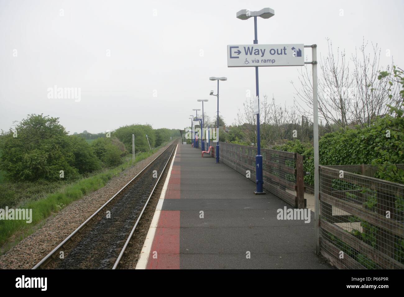 General view of the platform, signage and platform lighting at Monks ...