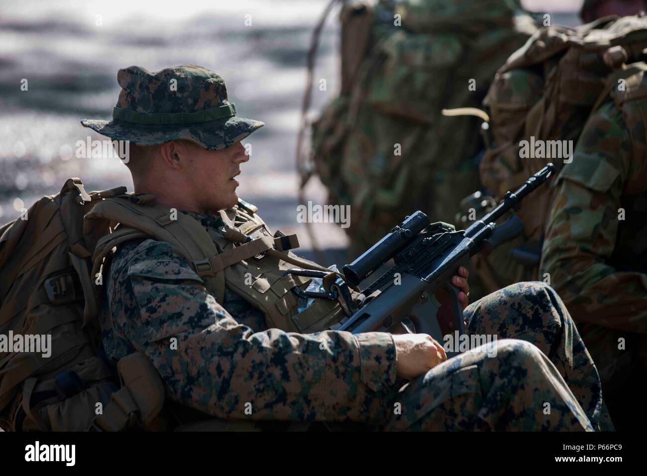 U.S. Marine Corps Lance Cpl. Tyler Camp and members of the Australian ...