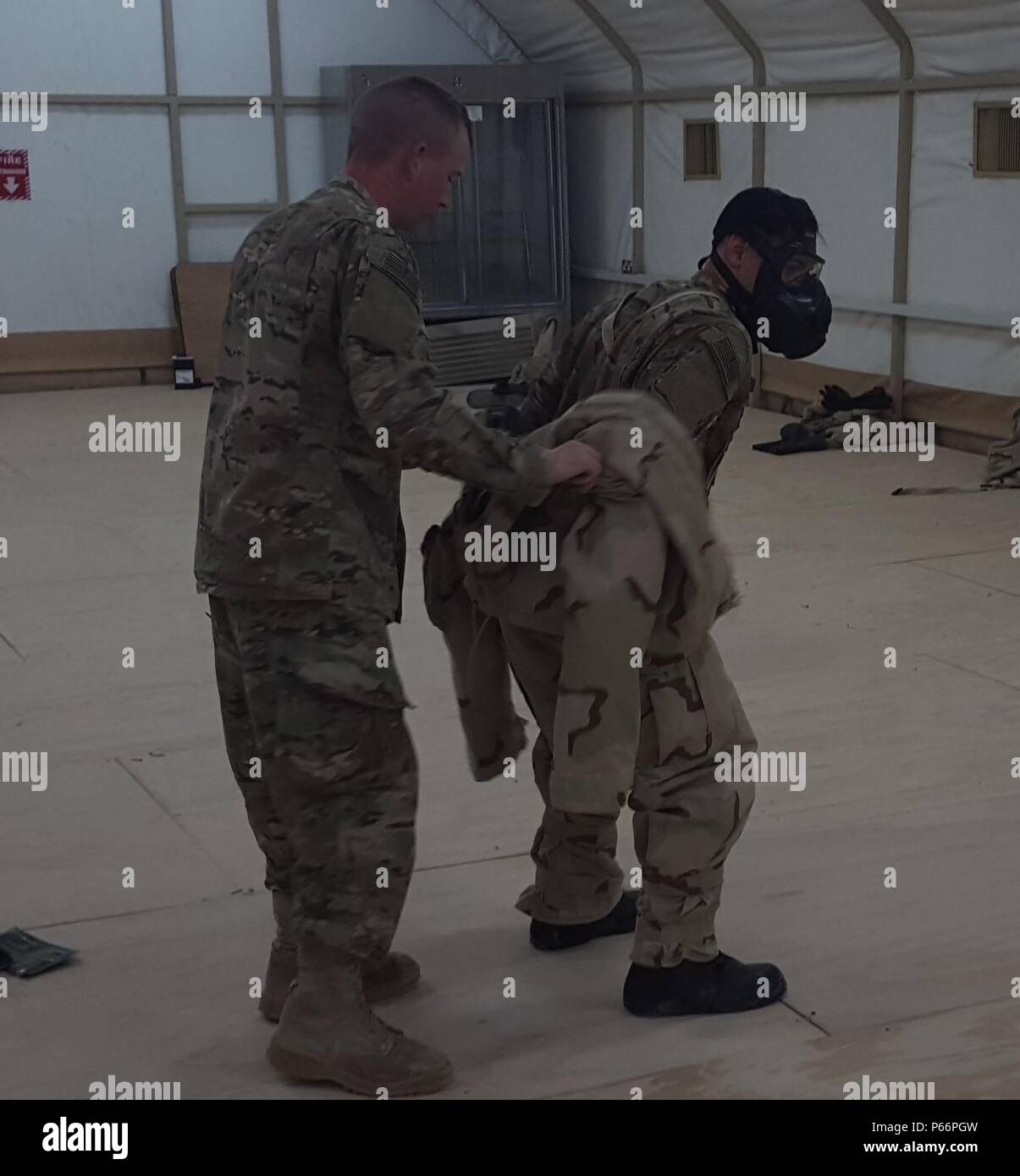 Capt. Matt McDuffie, left, Task Force Strike chemical, biological ...