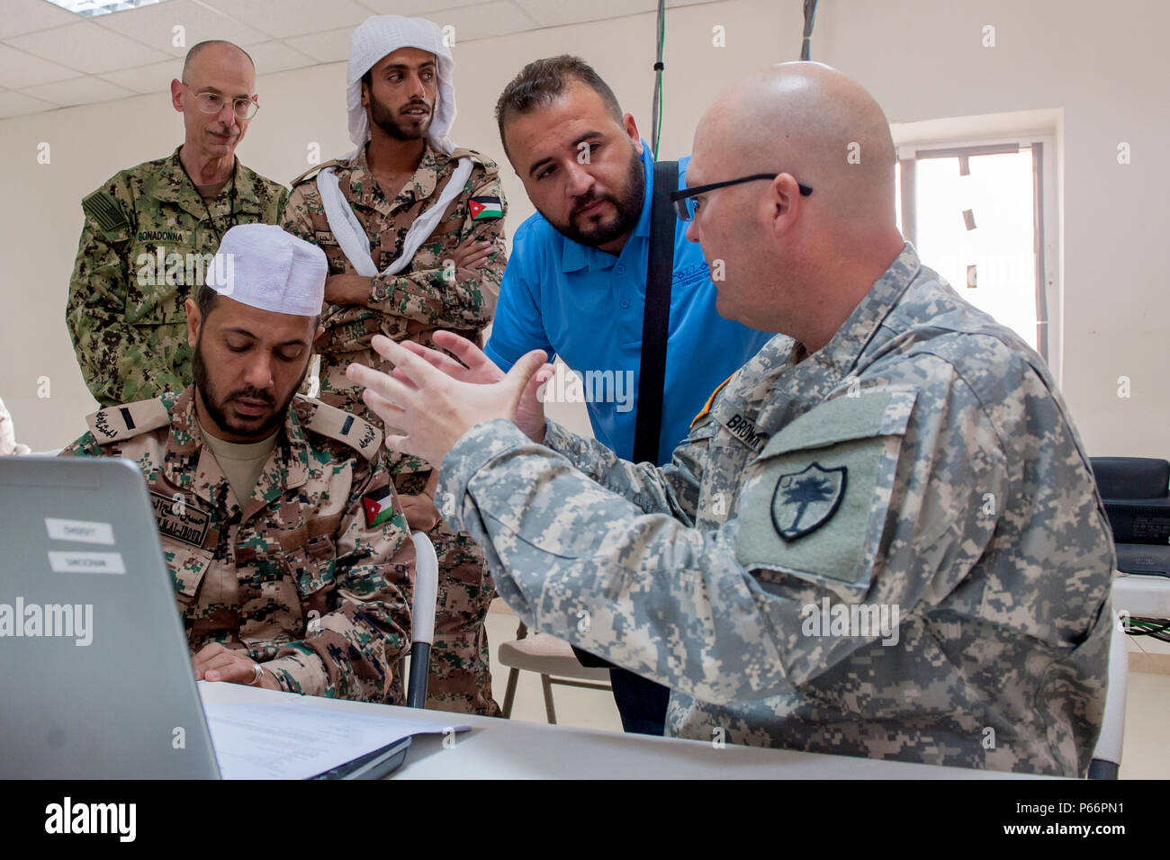 U.S. Army Chaplain, 1st Lt. Richard Brown, works with his Jordanian ...