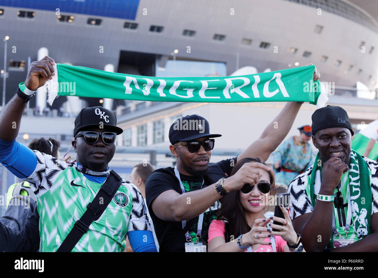 St. Petersburg, Russia - June 26, 2018: Nigerian football fans with a ...