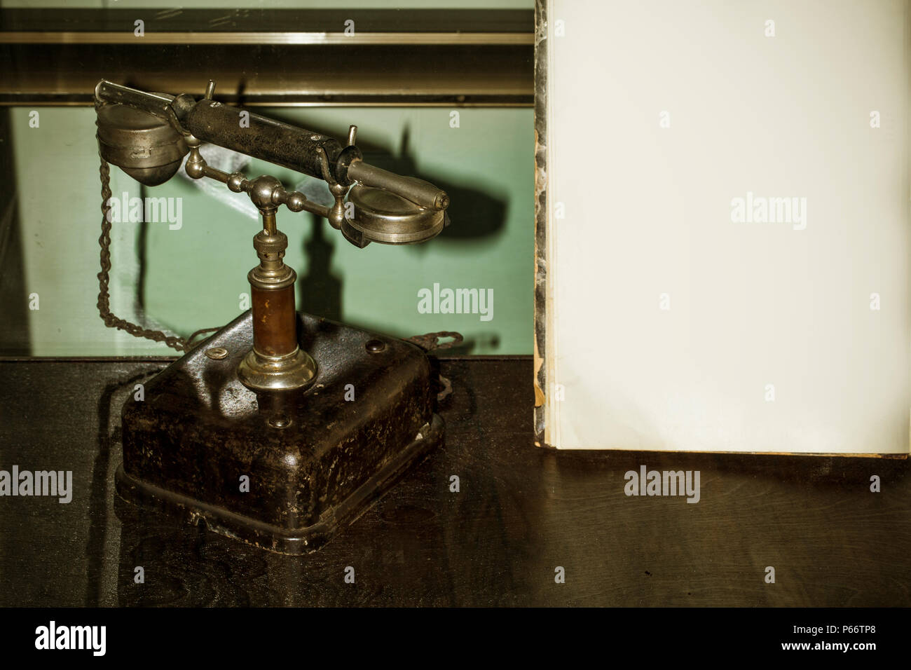 old retro phone made of metal with place for text Stock Photo - Alamy