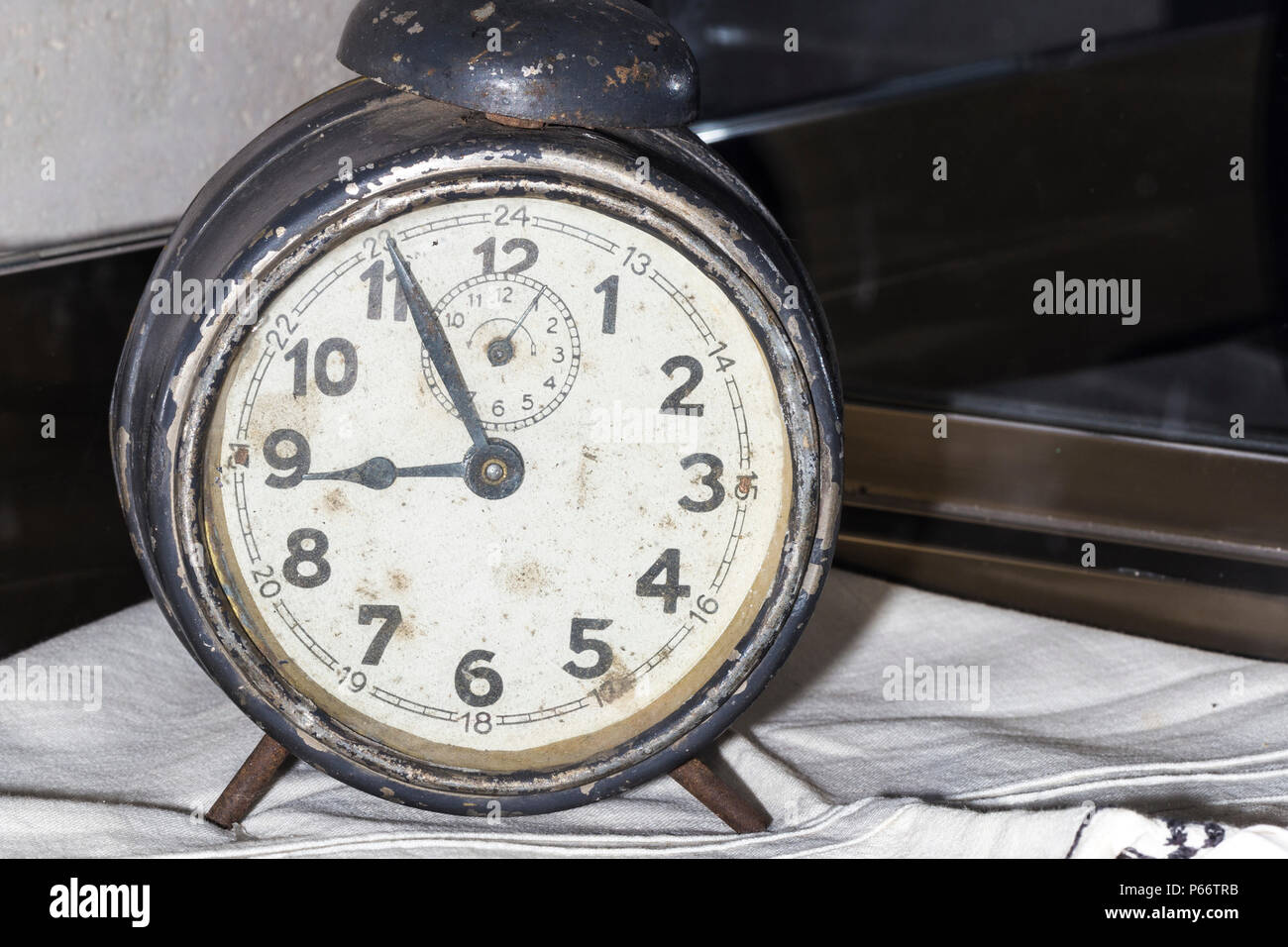 old retro clock with alarm, gray with a lot of scratches and rust Stock ...