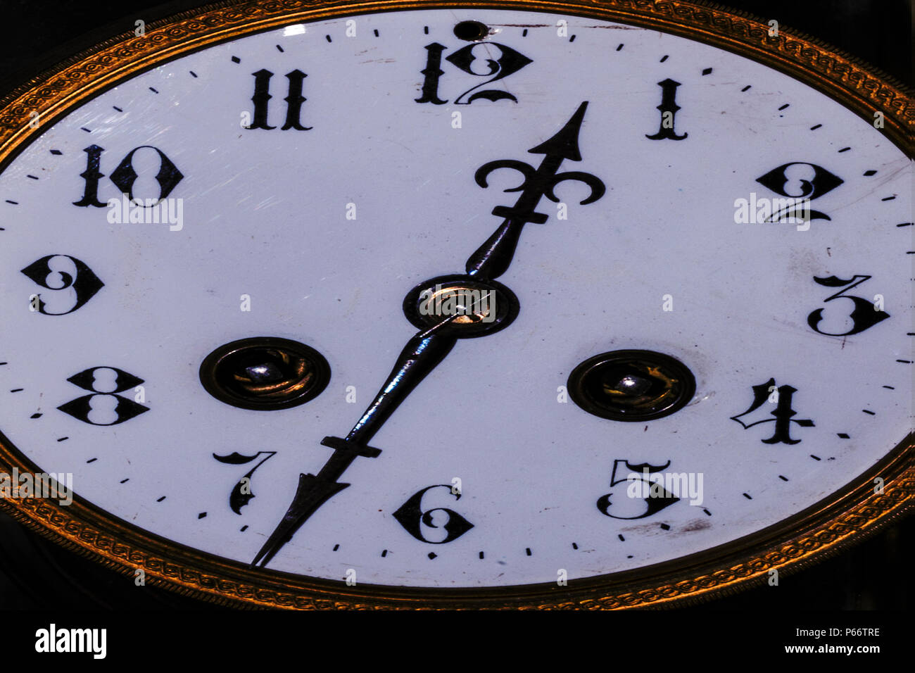 old white clock with black arrows, background image close-up Stock ...