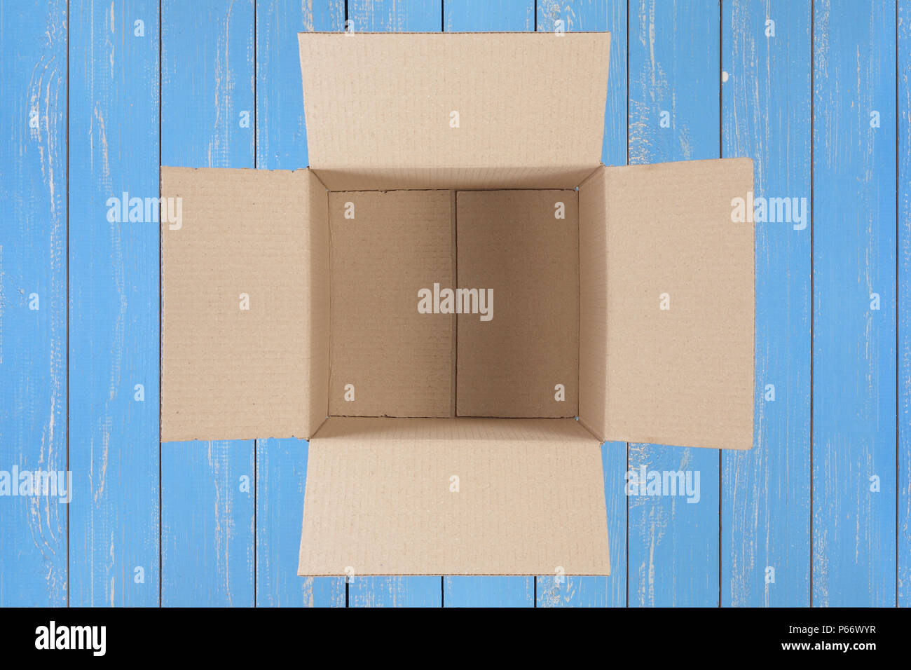 Postage and packing service - Open square Package top view on a blue ...