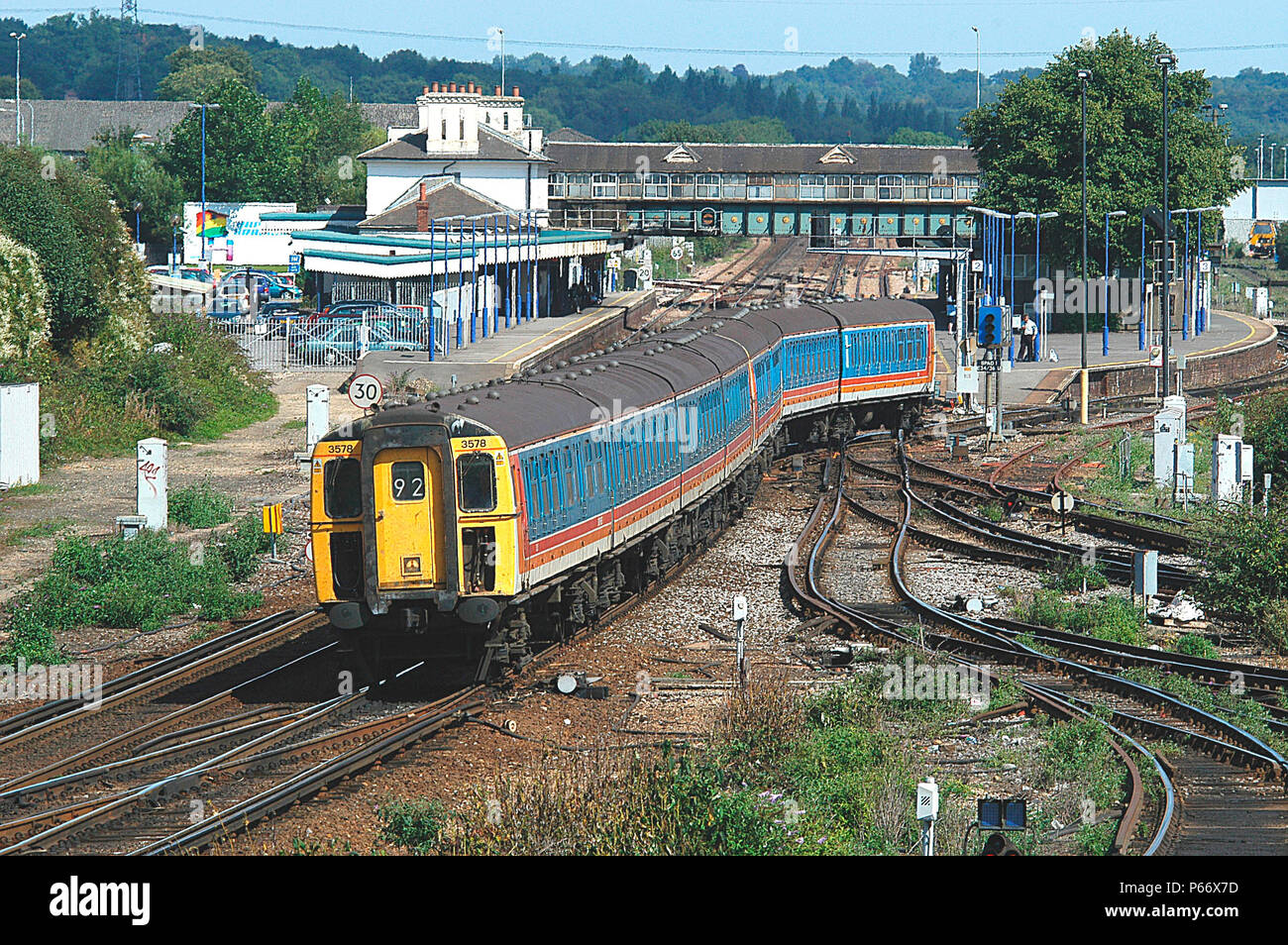 A South West Trains Class 423 with slam door stock, departs the station ...