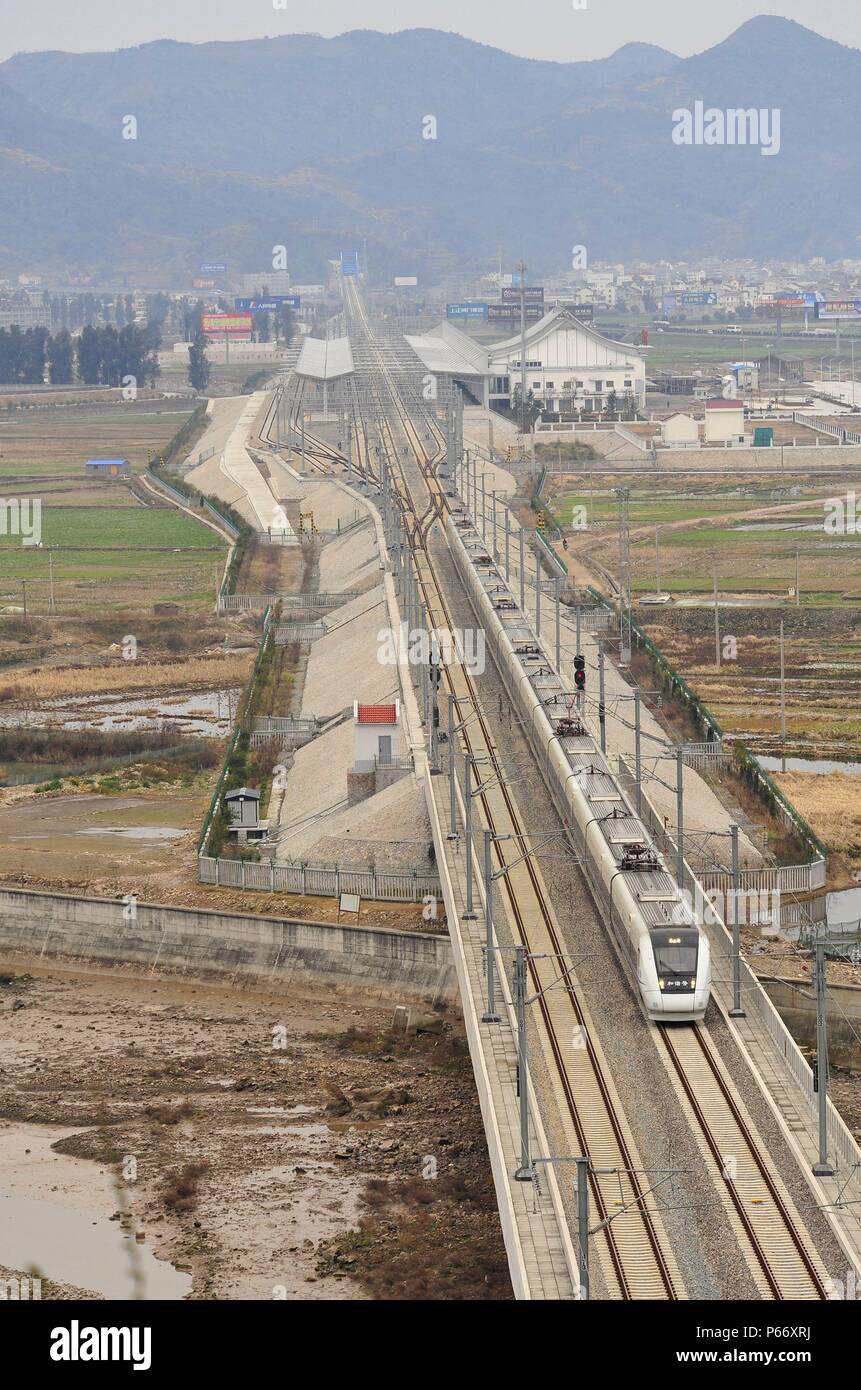 CRH 1 class electric multiple unit leaves Yandangshan railway station ...