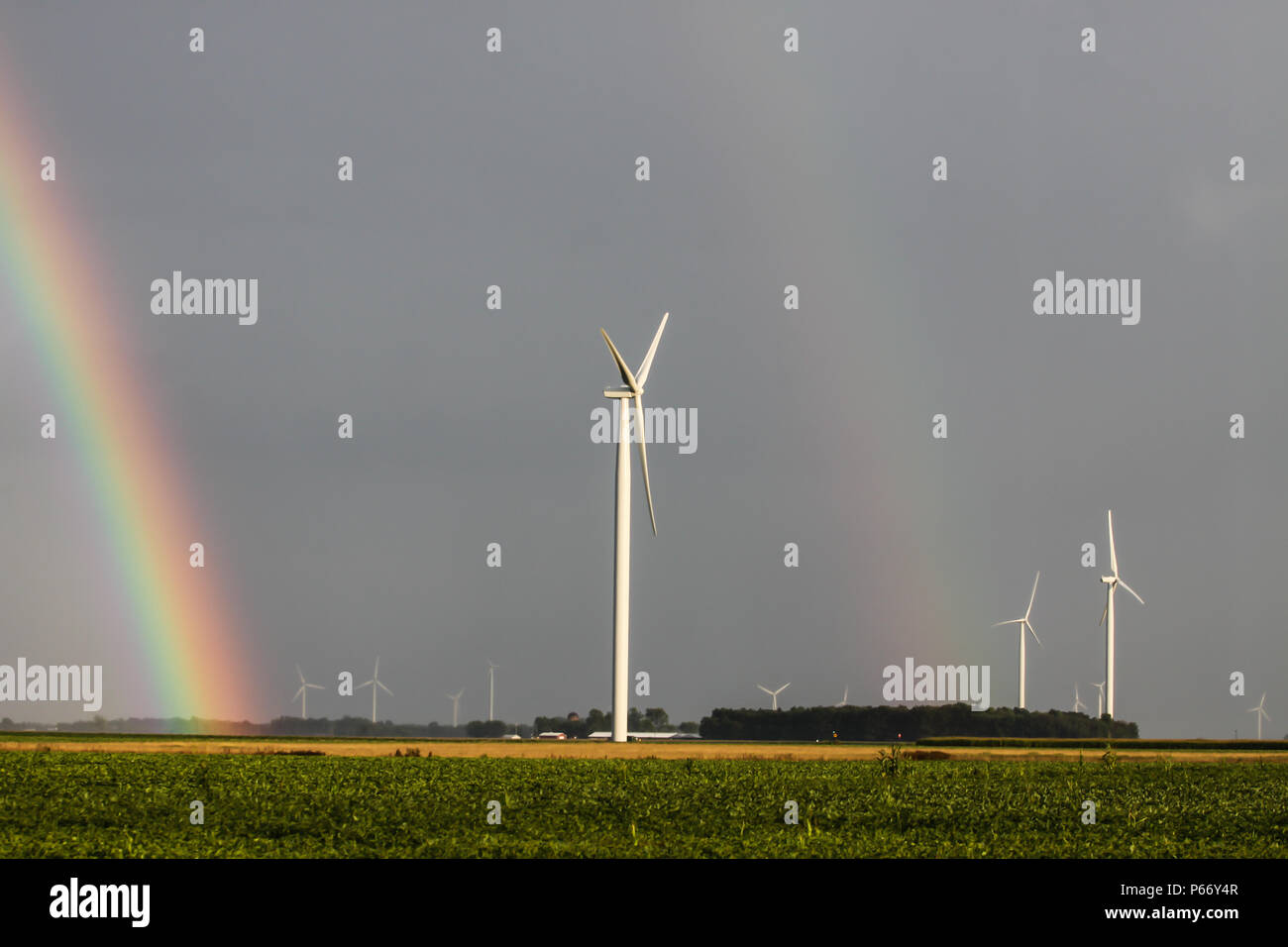 Windmills and a Rainbow Stock Photo - Alamy