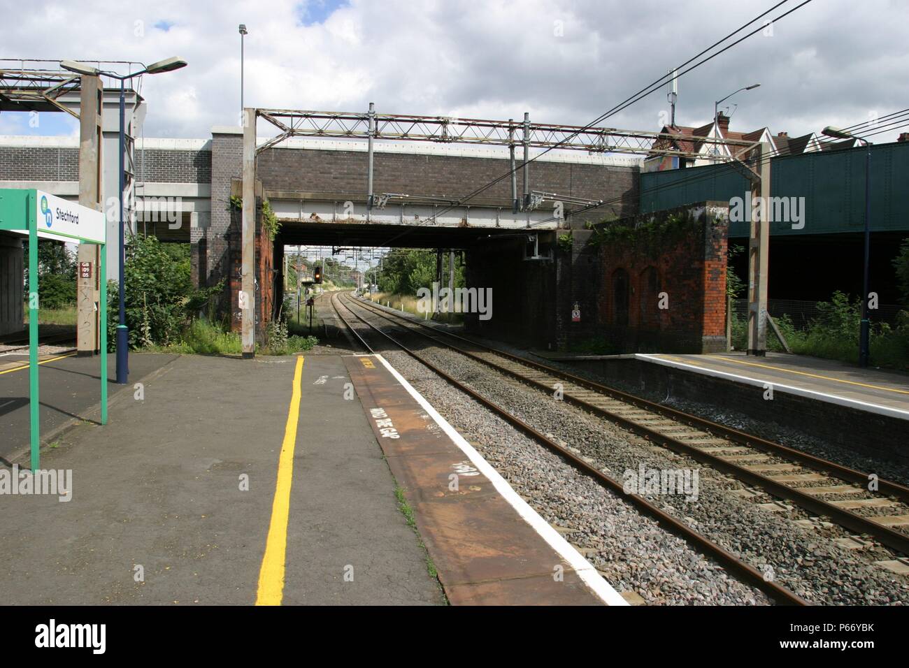 Platform end at Stechford station, West Midlands, showing the road ...