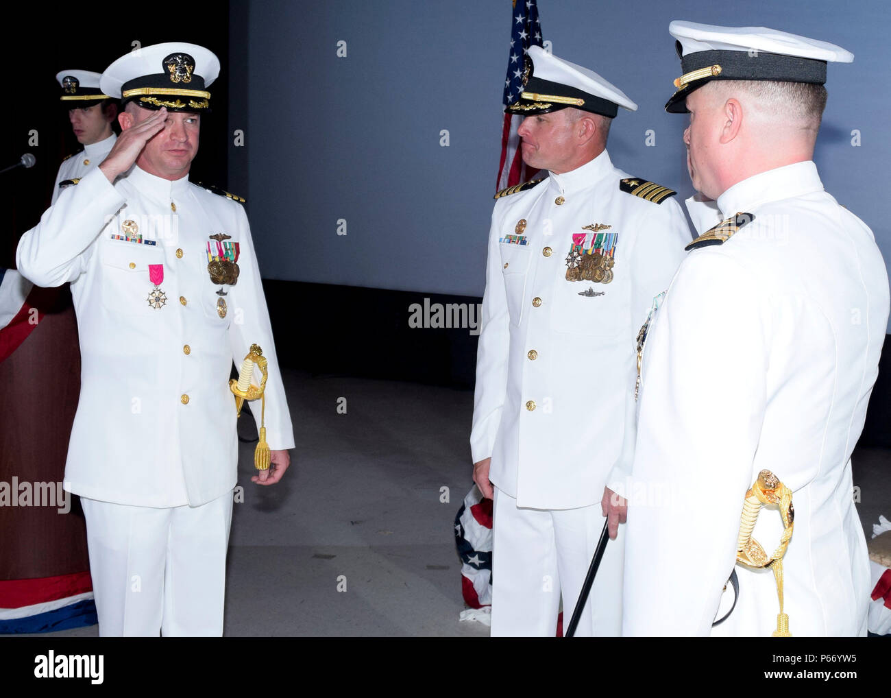 Capt. Jeffrey Grimes, center, commander, Submarine Squadron 15 ...
