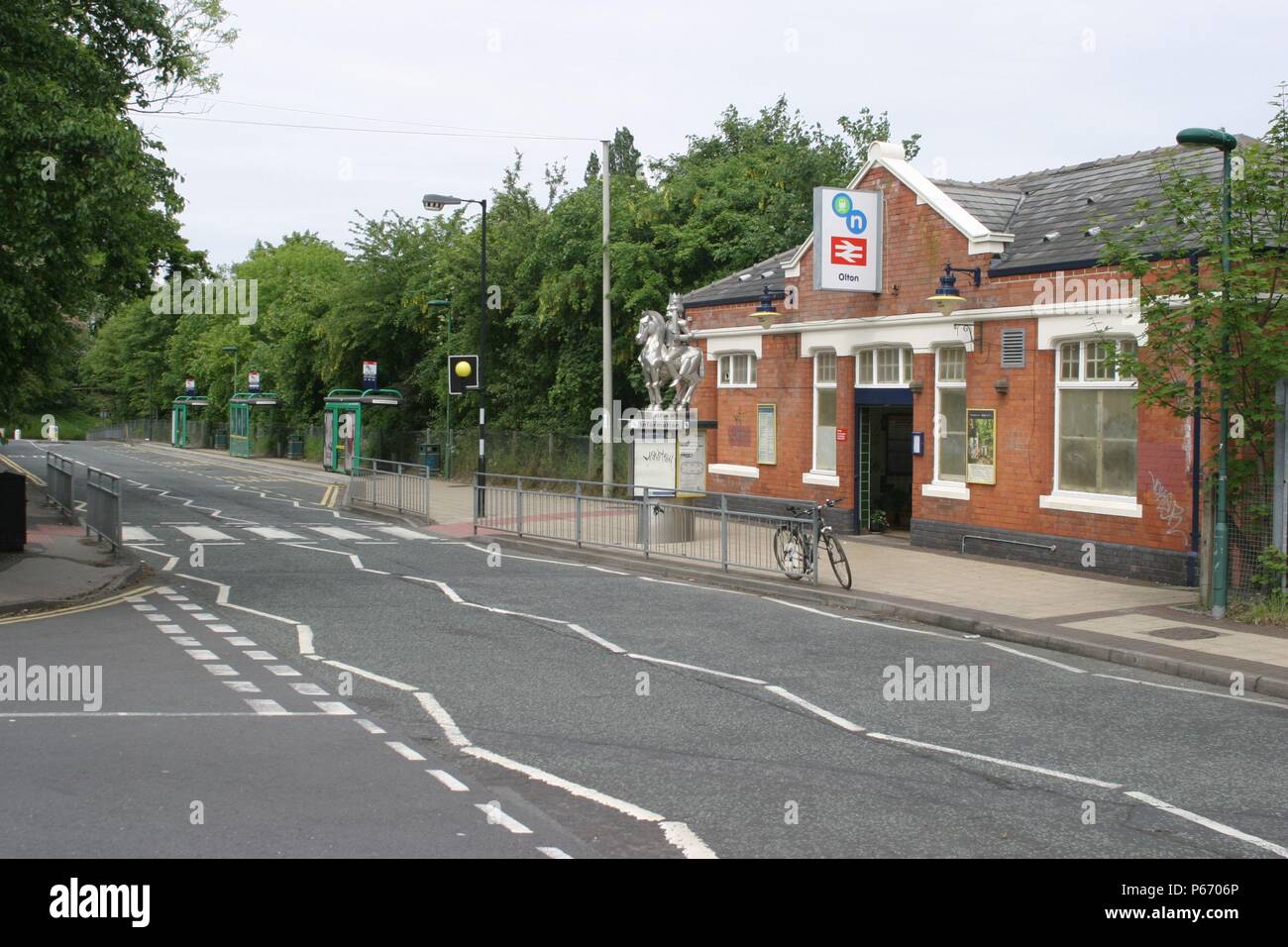 Station frontage, roadway and pedestrian crossing at Olton station ...