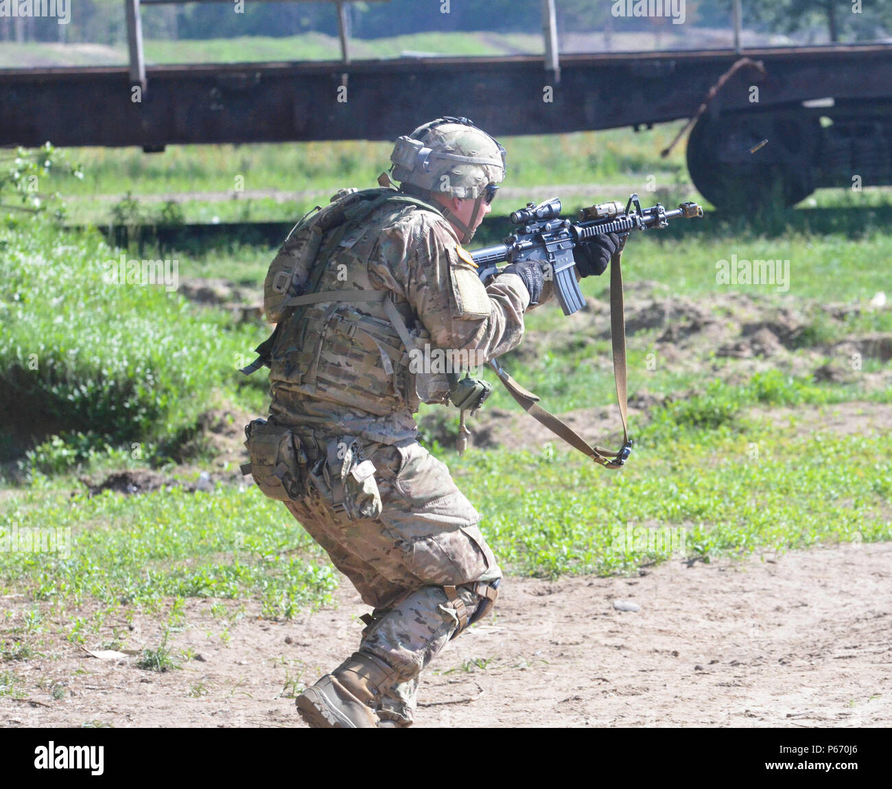 A Soldier with Joint Multinational Training Group-Ukraine approaches ...