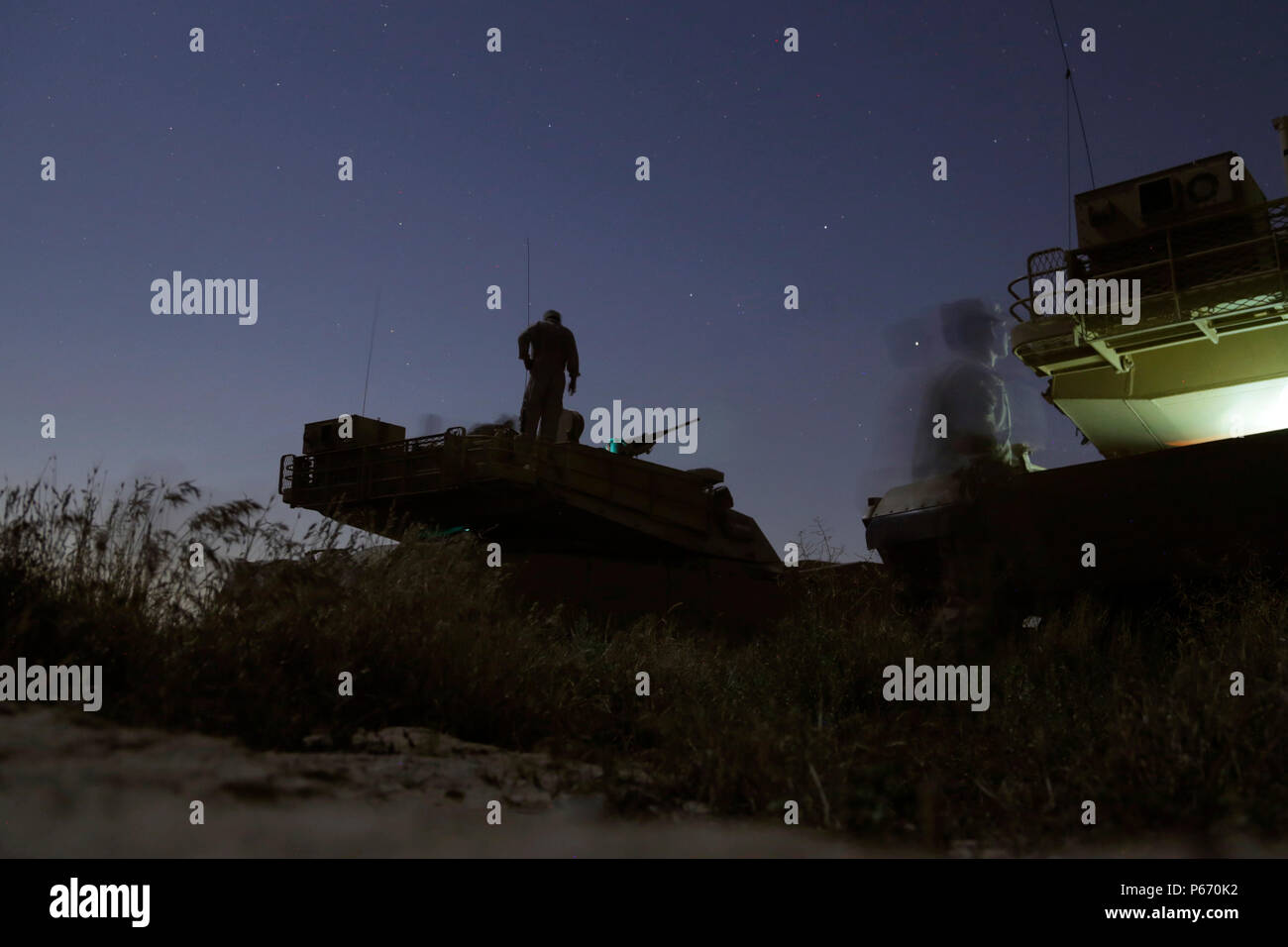 Iraqi soldiers, with the 35th Iraqi Army Brigade, conduct pre-mission ...