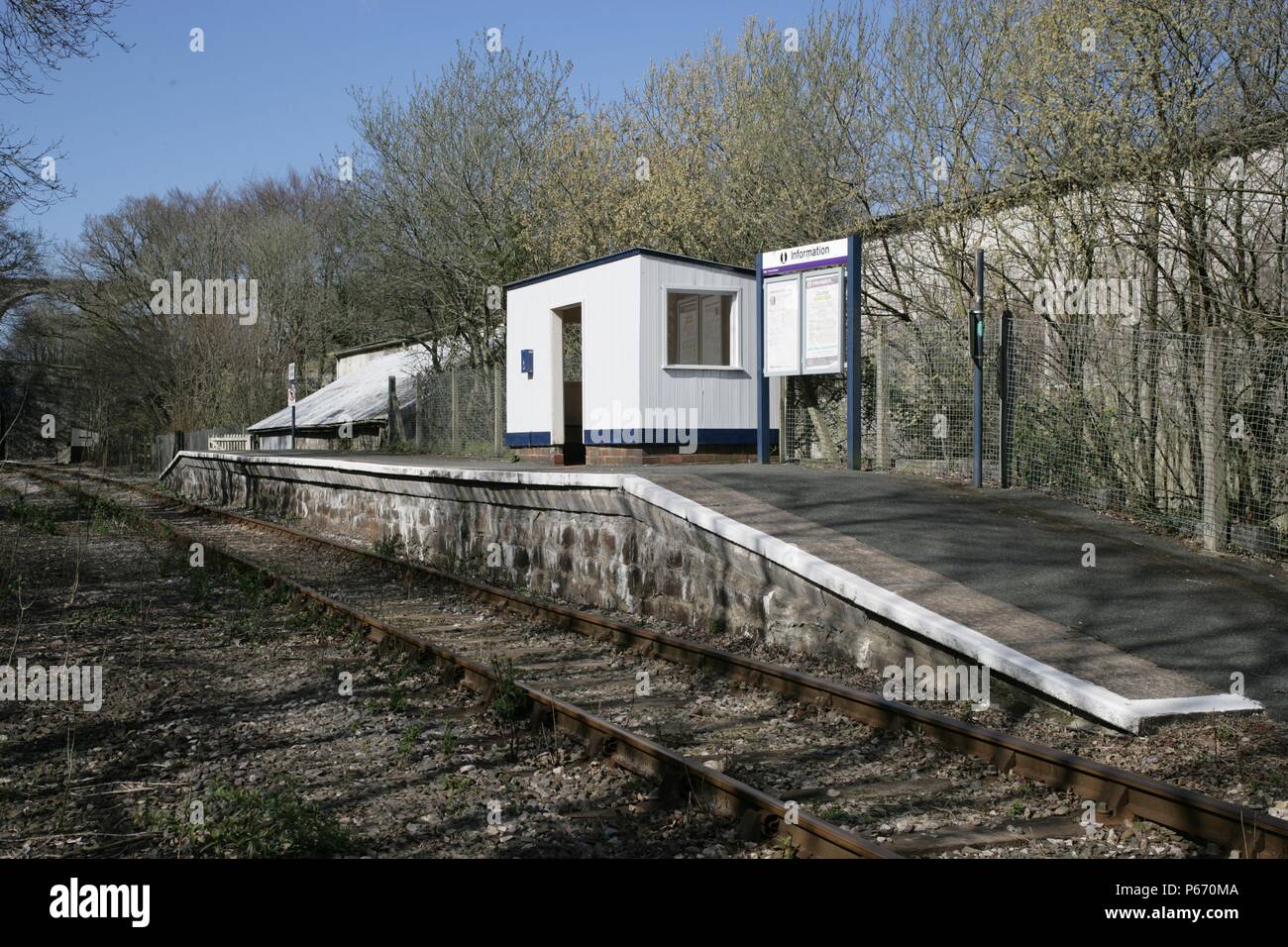 The platform, waiting shelter and traveller information board at Coobe ...