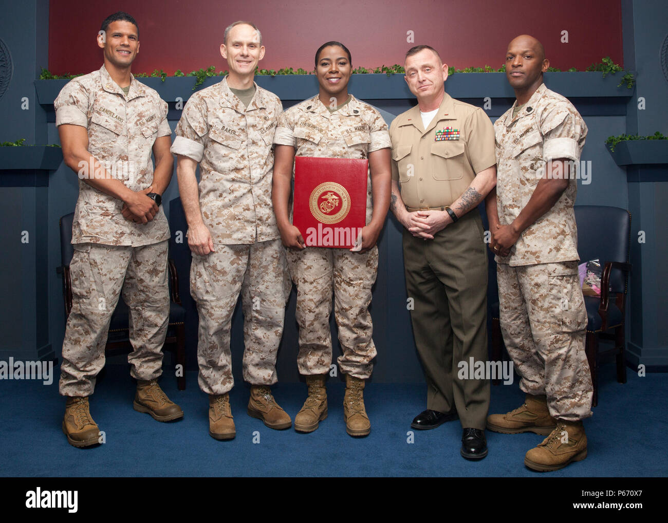 From left, U.S. Marine Corps Maj. Nelson F. Candelario, judge advocate ...