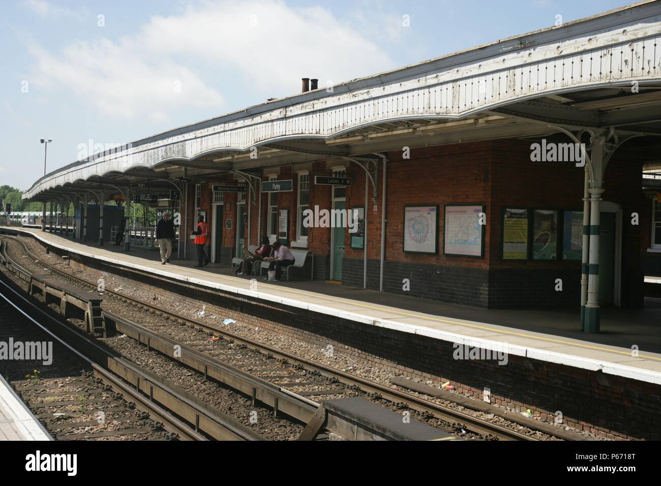 View of platform buildings, tracks and platform canopy at Purley ...