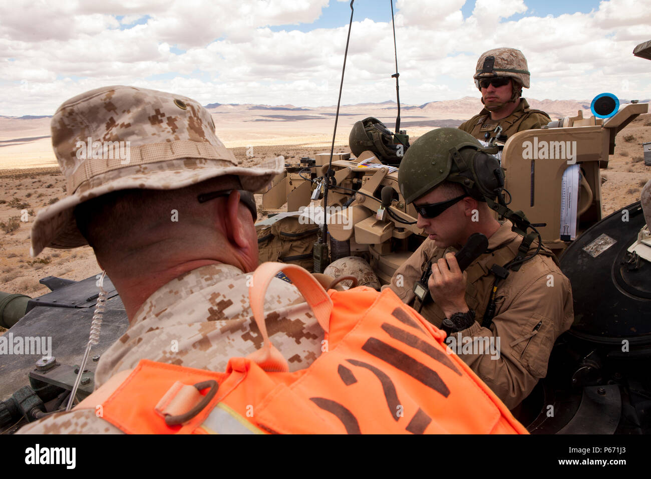 U.S. Marines with 2nd Tank Battalion, Bravo Company, perform a call for ...