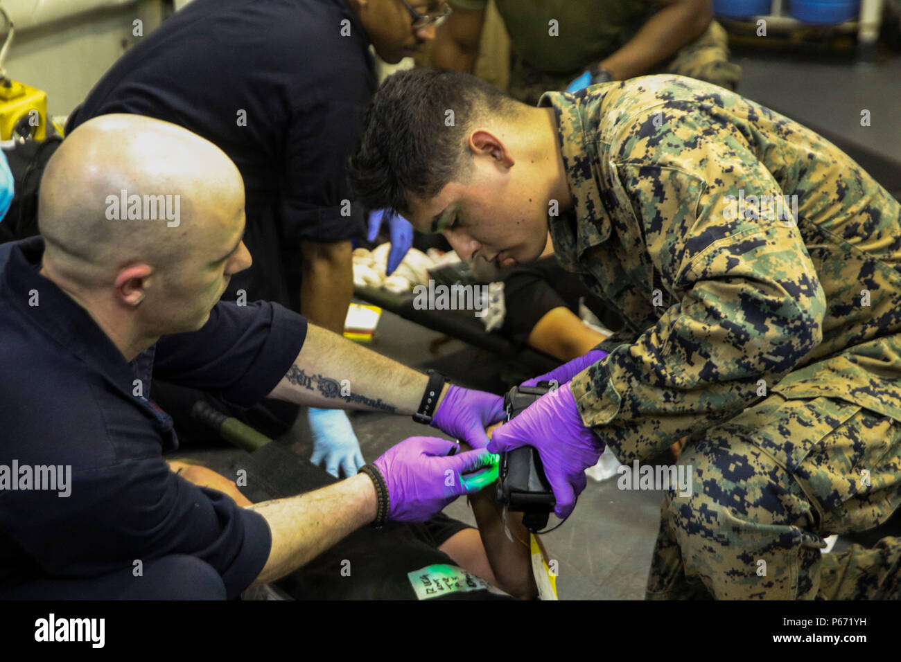 U.S. Marines and U.S. Sailors with the 22nd Marine Expeditionary Unit ...