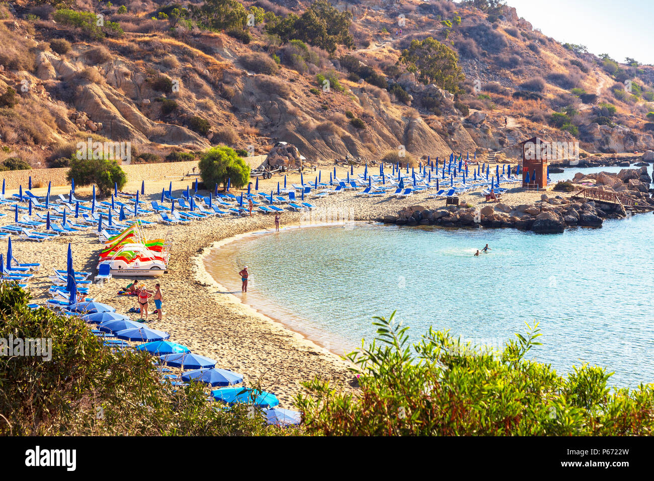 Early morning sunrise at Konnos Bay with a view towards Cyclops Cave ...