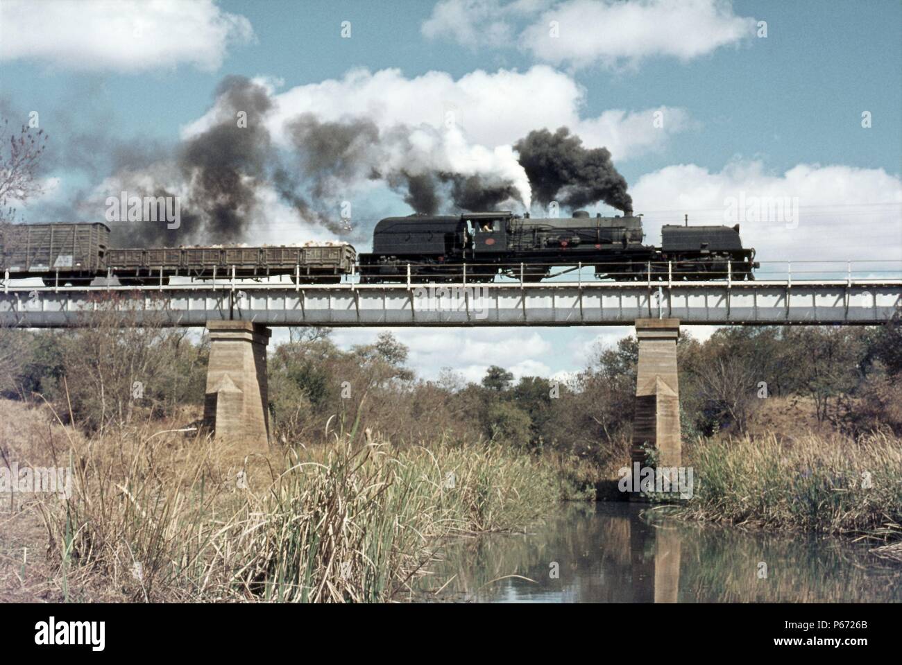 A Rhodesia Railways 14A class 2-6-2 + 2-6-2 Garratt crosses the viaduct ...