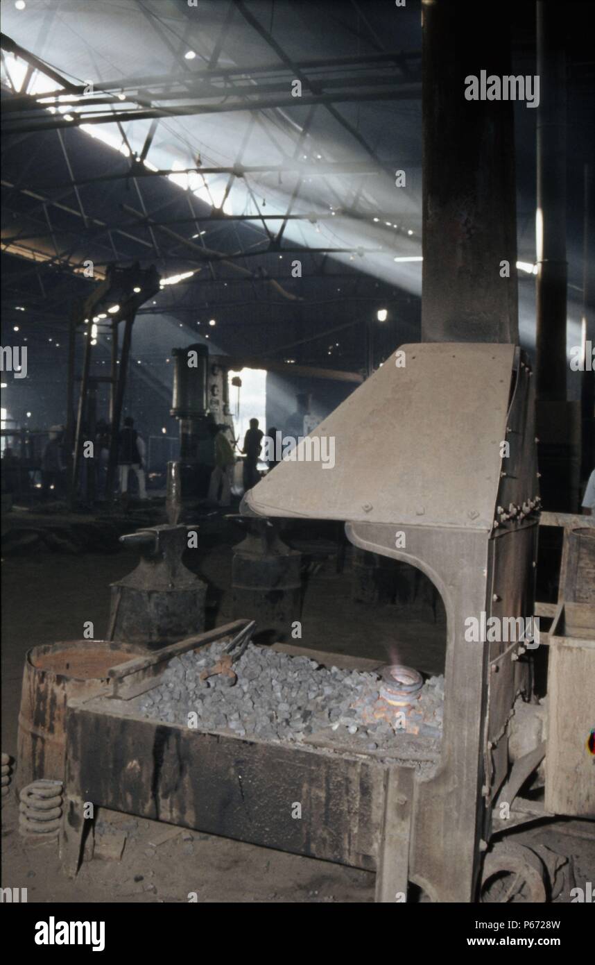 A scene in the Smithy at Atbara Railway Works showing springs in the ...