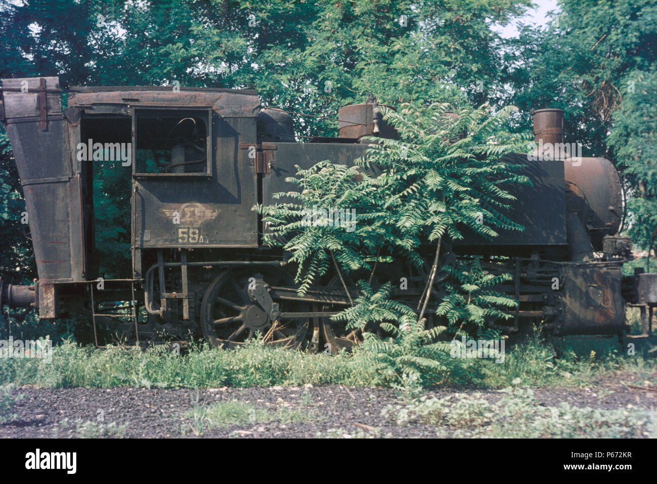 A United States Army Transportation Corps 0-6-0T lies abandoned in the ...