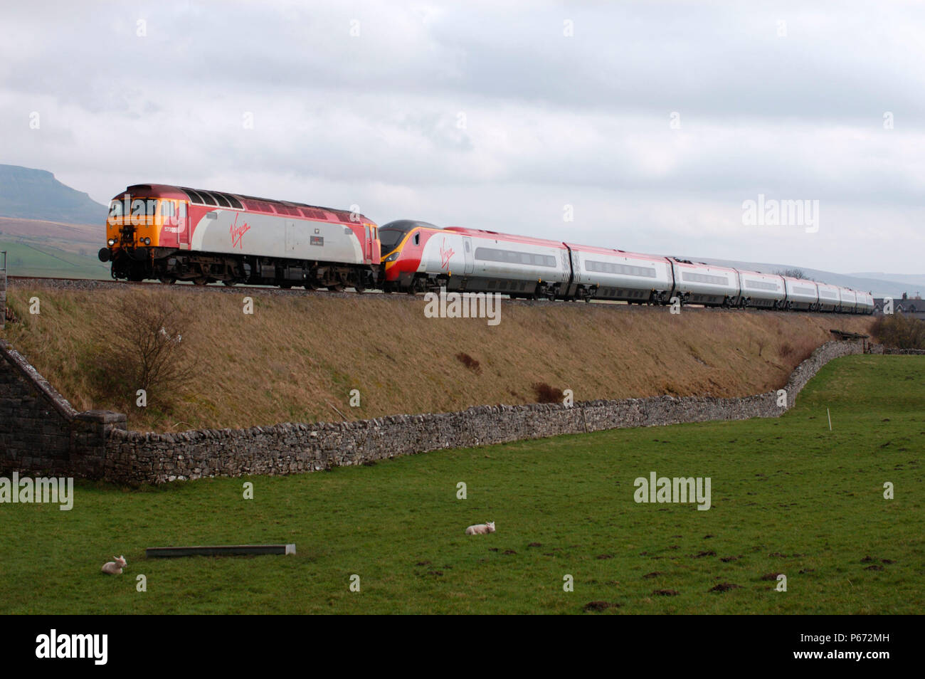 A Virgin Class 57/3 Thunderbird diesel locomotive hauls a Pendolino ...