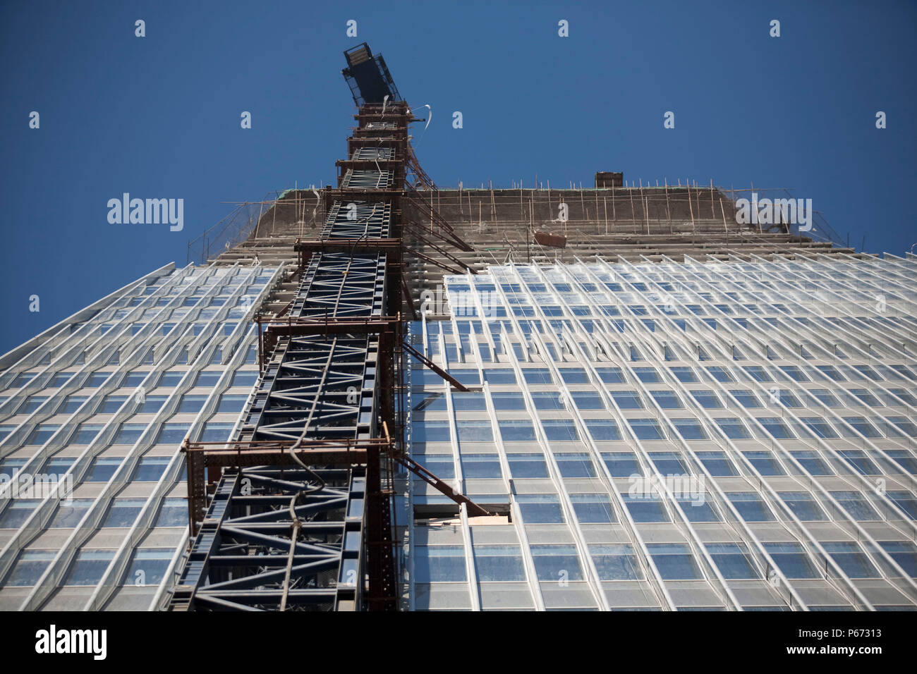 Tower Crane attached to building during construction Stock Photo - Alamy