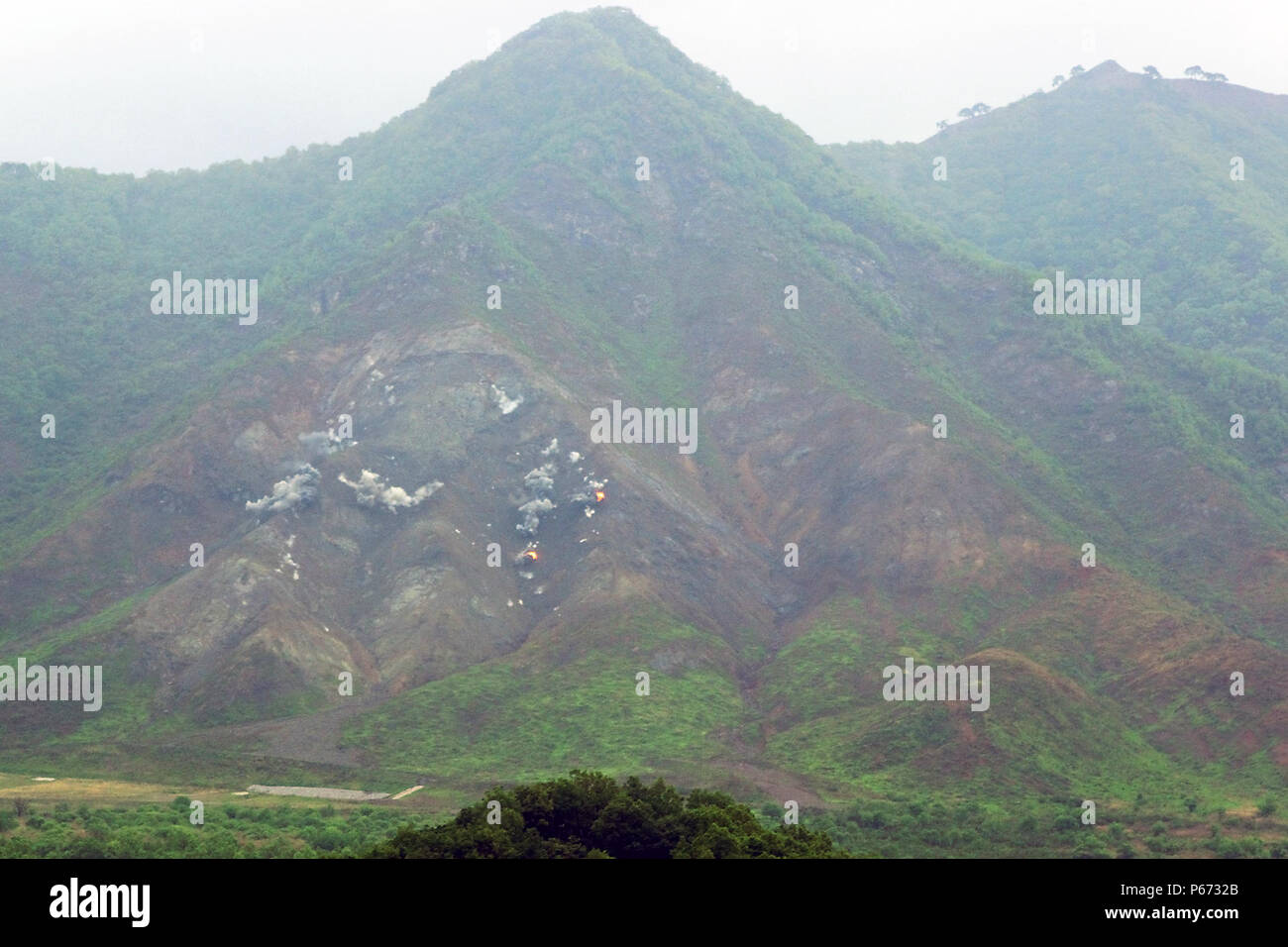 Coordinated 155 mm fires from U.S. and South Korean batteries impact a ...