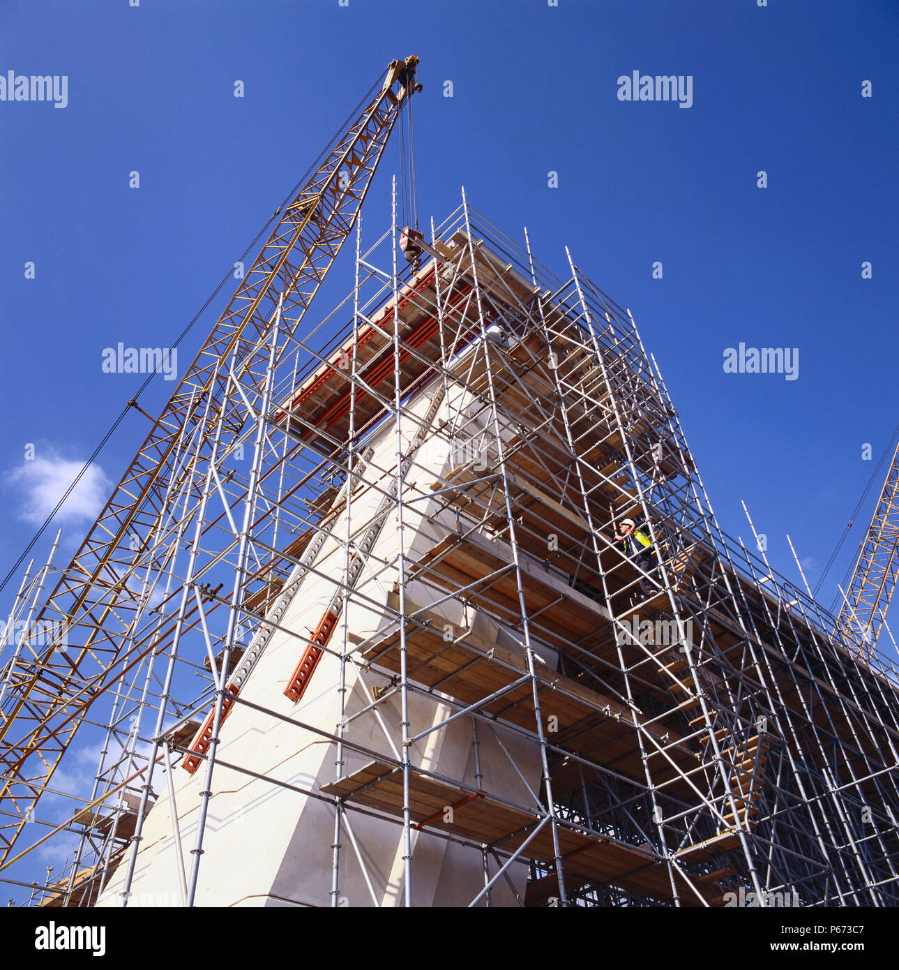 Concrete column on bridge viaduct encased in scaffold Stock Photo - Alamy