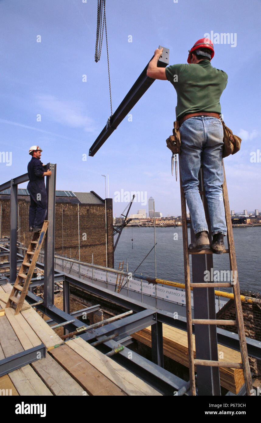 Working on ladders hi-res stock photography and images - Alamy