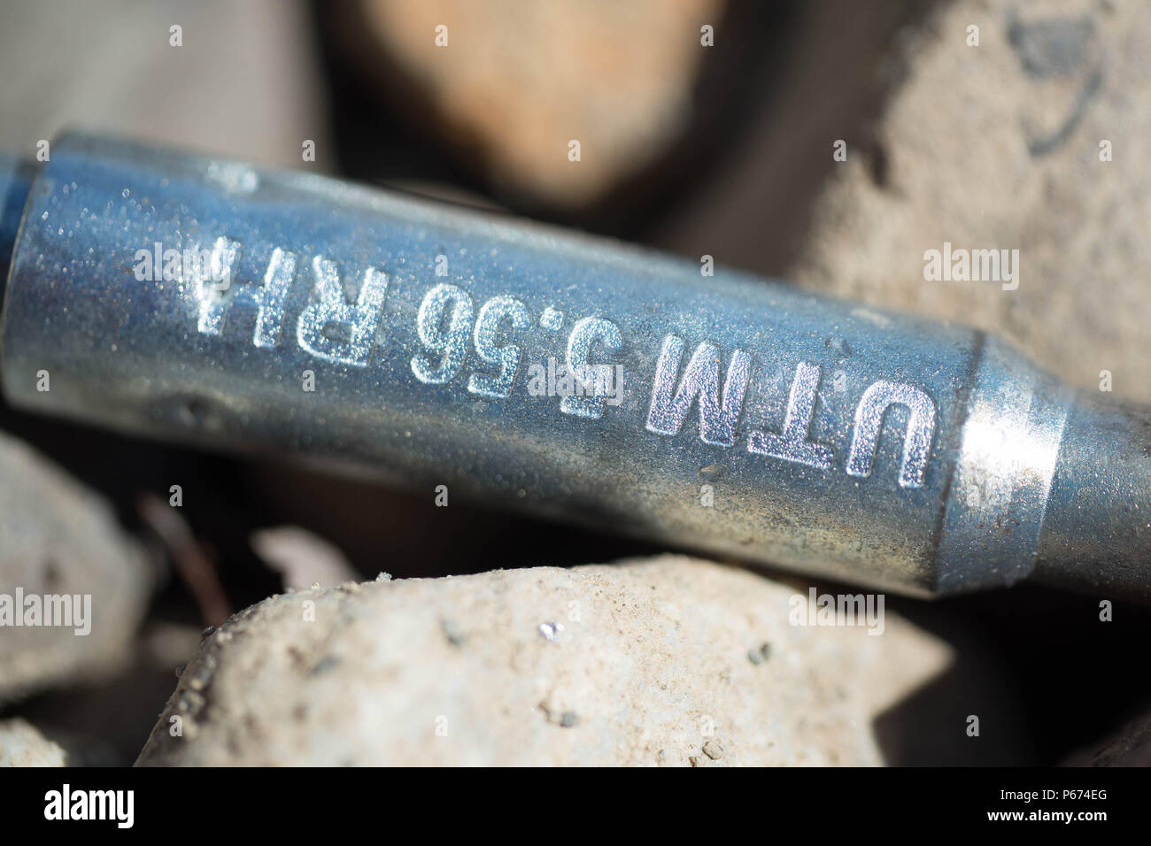 An expended paint-marker training munition rests May 14, 2016, at the ...