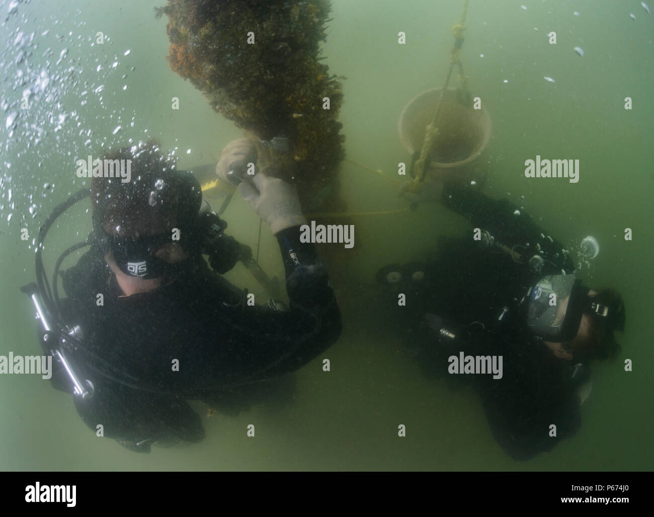 Hospital Corpsman 1st Class James Aldridge (left) and Builder 2nd Class ...