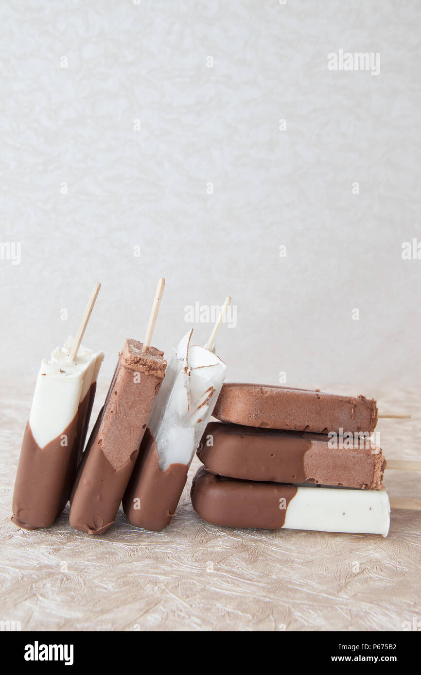 Chocolate covered ice cream popsicles with vanilla and coconut Stock ...