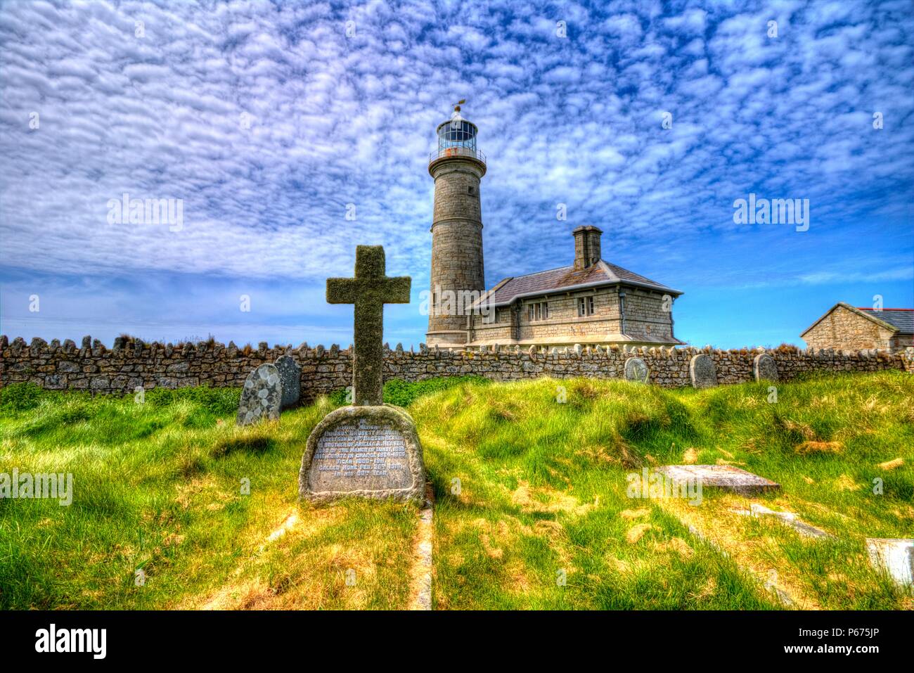 Old Light lighthouse on Lundy Island seen from the cemetery. The ...